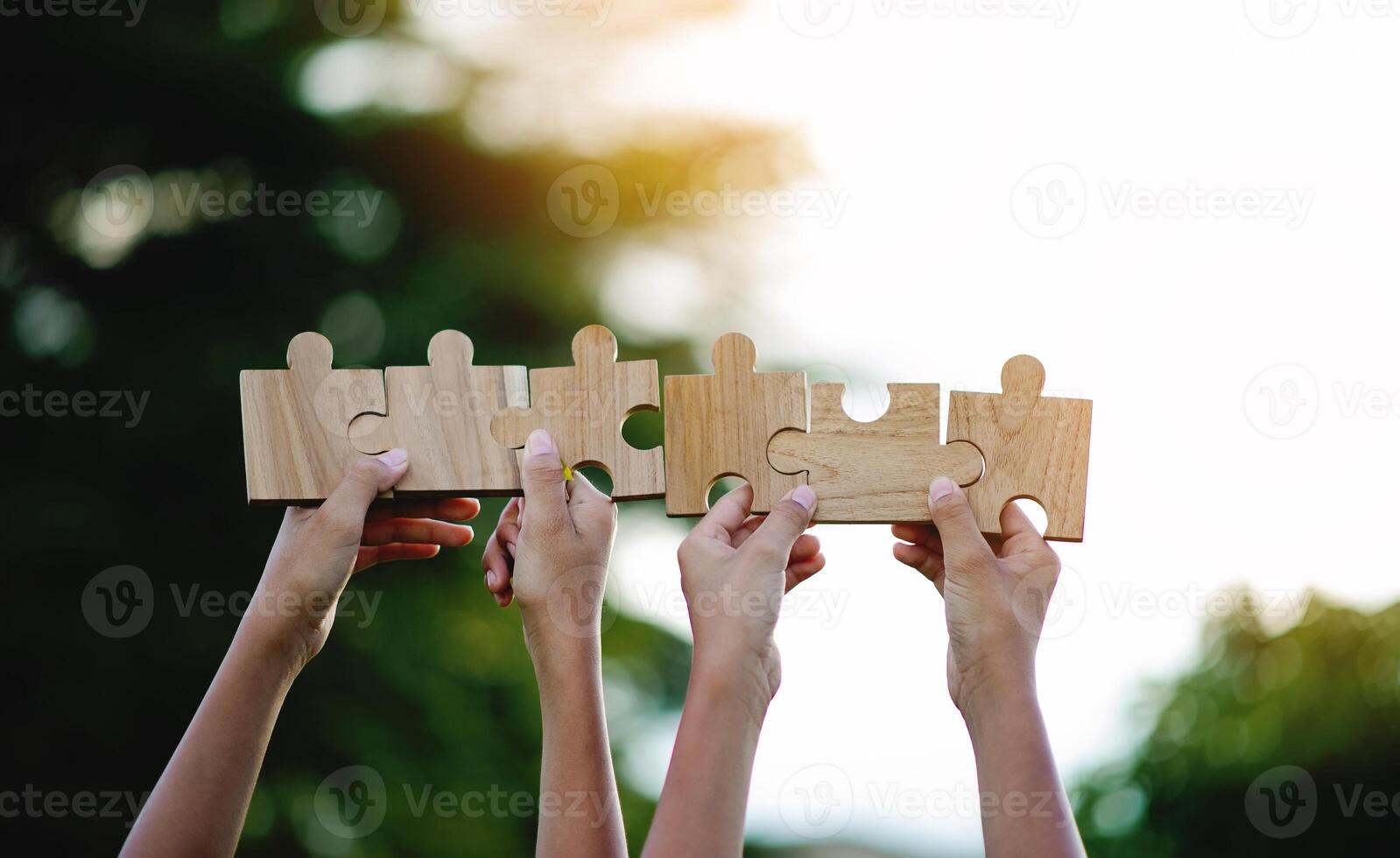 Jigsaw puzzle of great group cooperation, unity and happy working ...