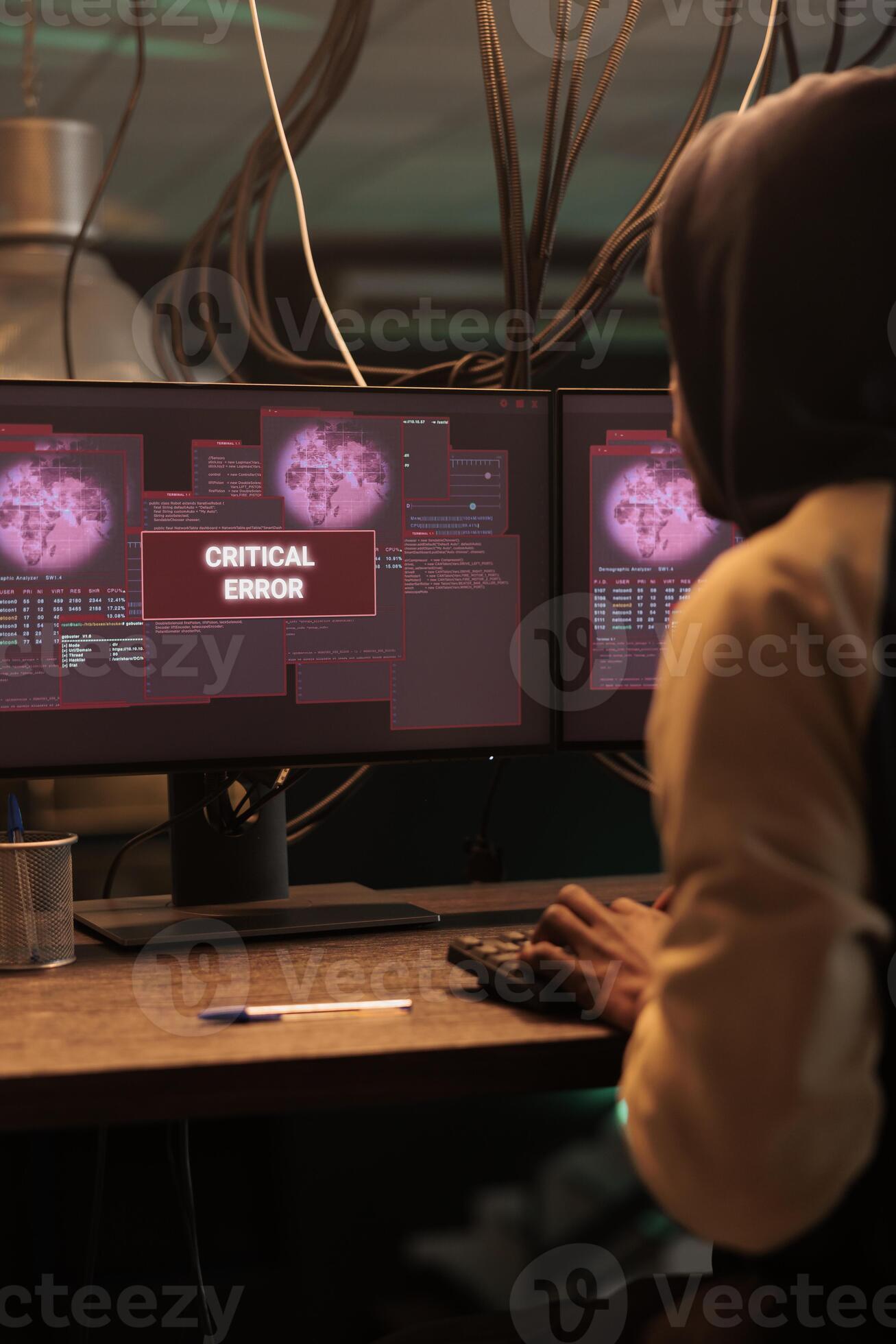 Cyberattack warning on computer screen, hacker stealing data, breaking into database. Malware ...