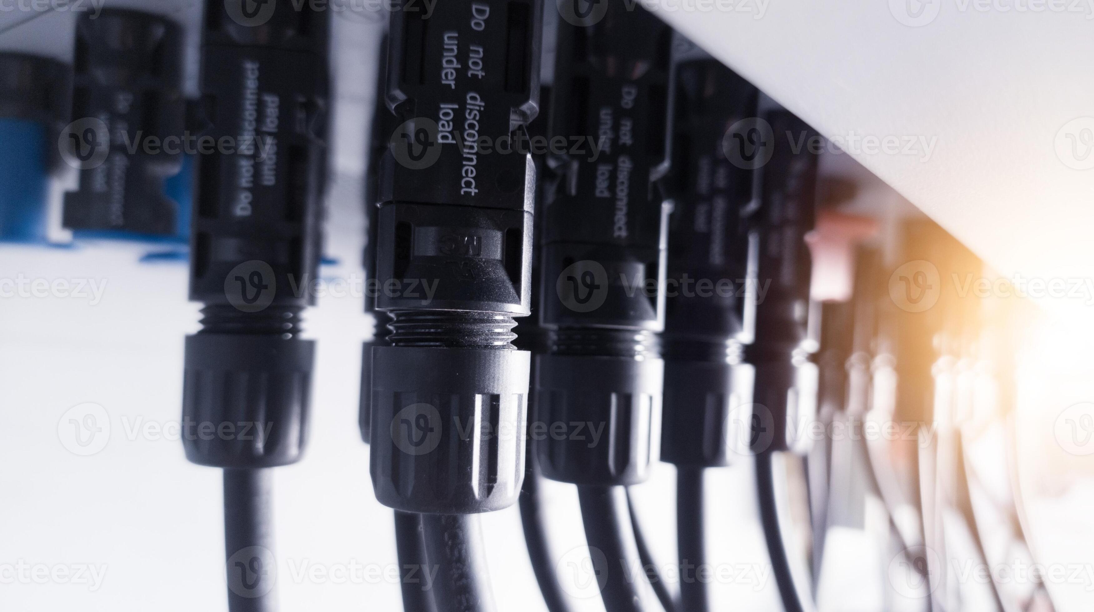 Cable connecting the power from the solar panel to the inverter with ...