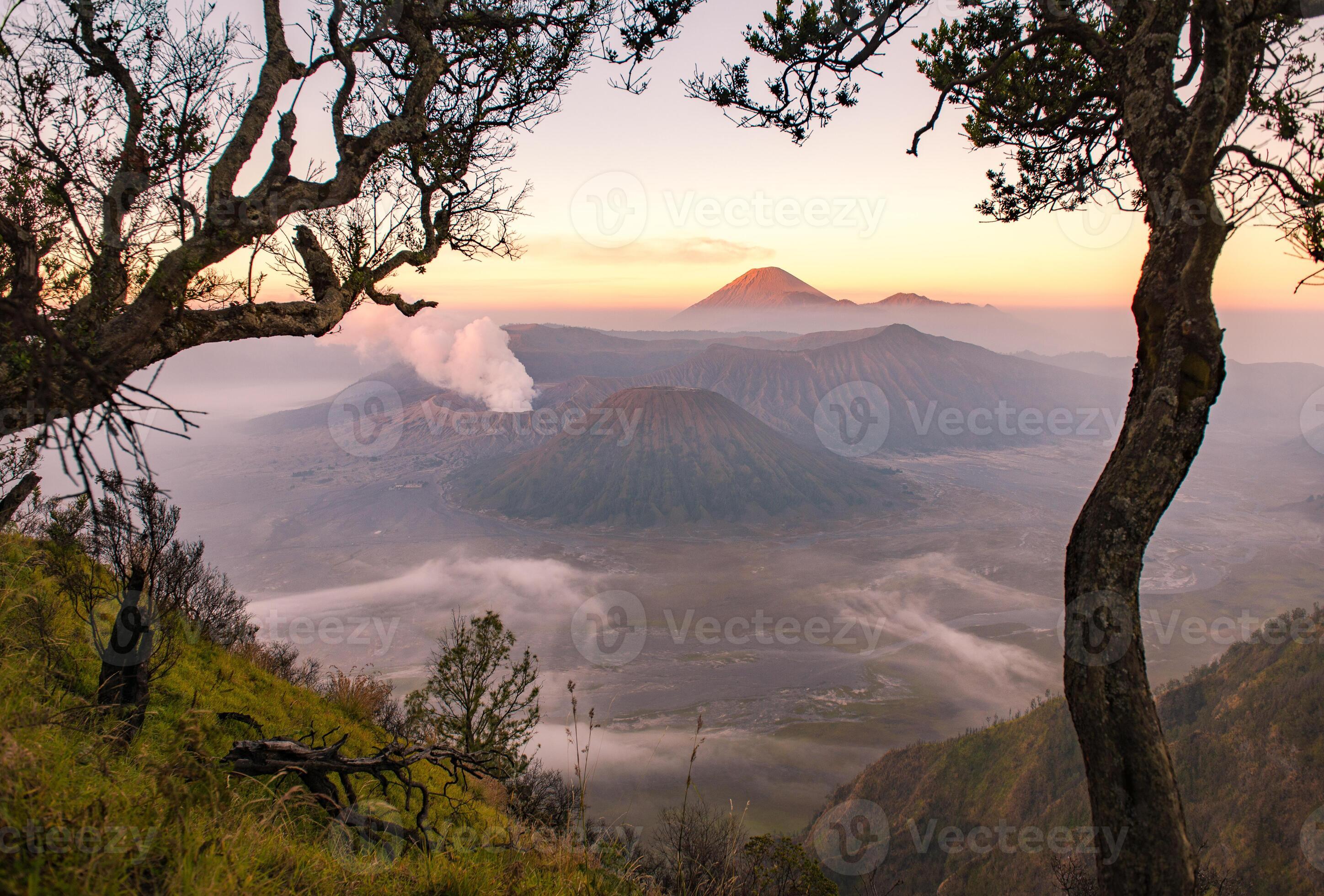 Spectacular view of Mount Bromo at dawn view look through the natural ...