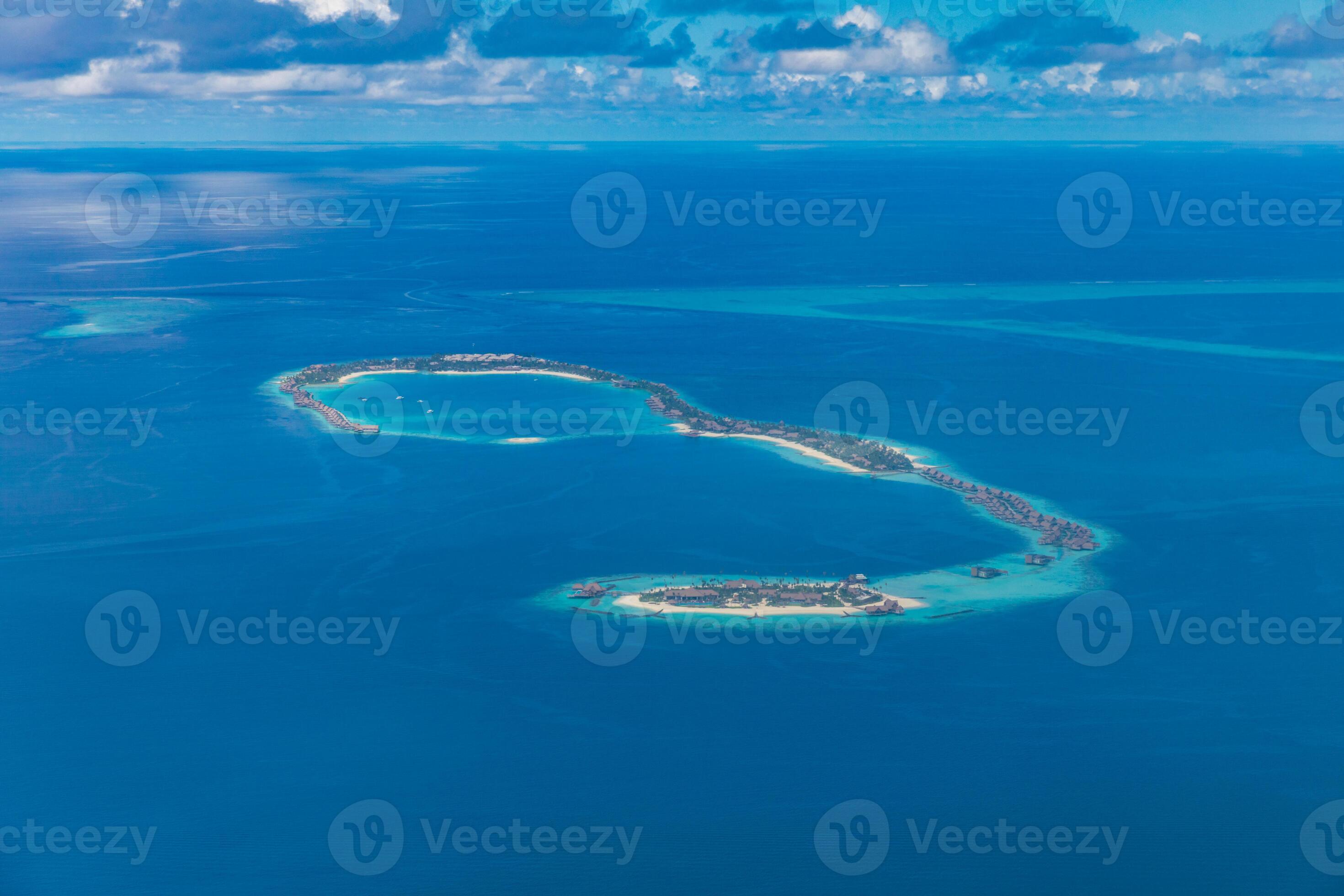 Aerial view on Maldives island, Ari atoll. Tropical islands and atolls in Maldives from aerial ...