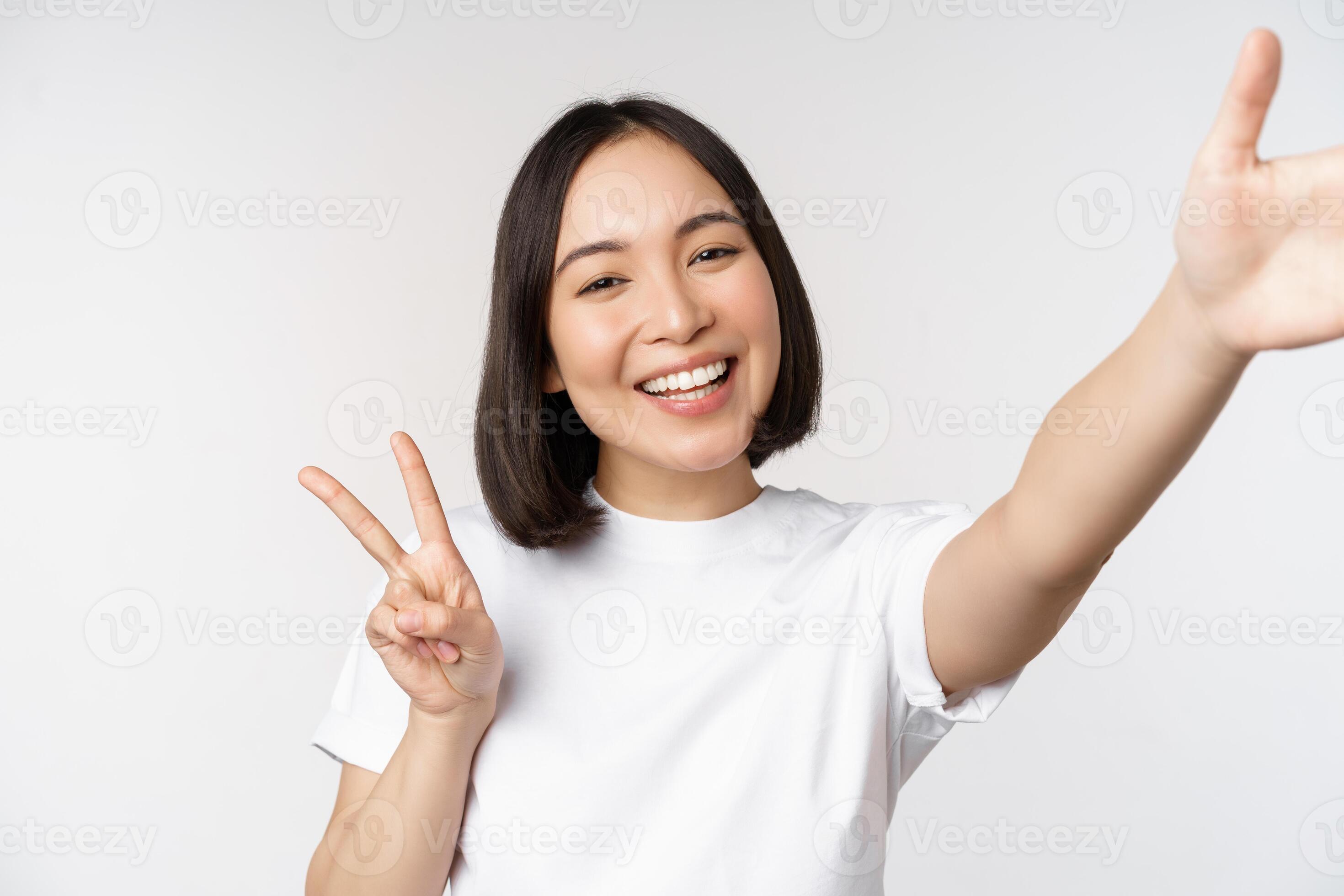 Beautiful Young Asian Woman Taking Selfie Posing With Peace V Sign