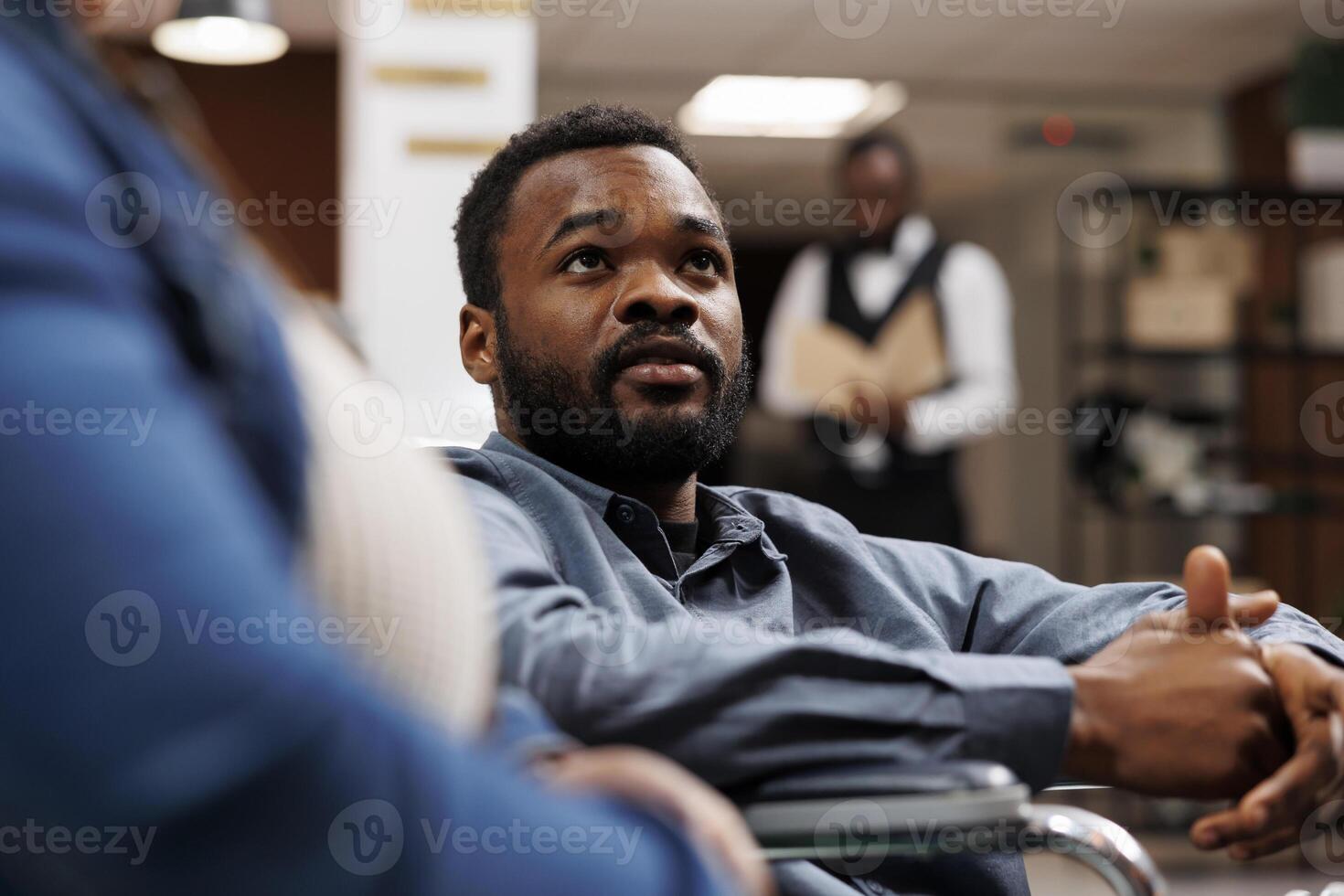 African american traveler in wheelchair arriving at hotel with disabled ... African american traveler in wheelchair arriving at hotel with disabled ...
