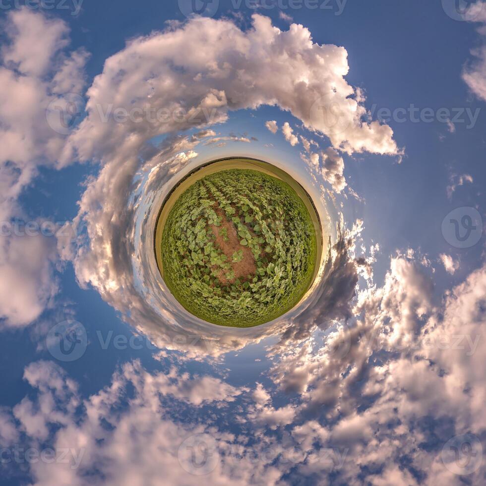 simple green tiny planet without buildings in blue sky with beautiful ...