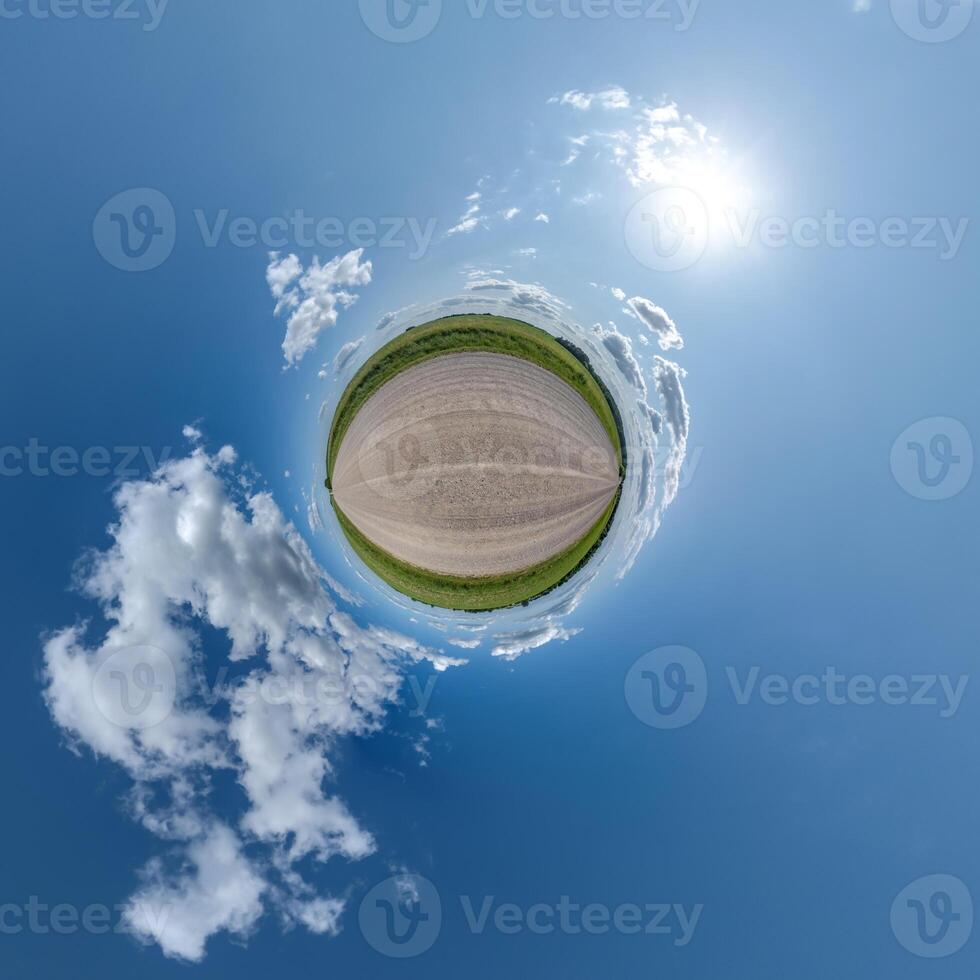 simple green tiny planet without buildings in blue sky with beautiful ...