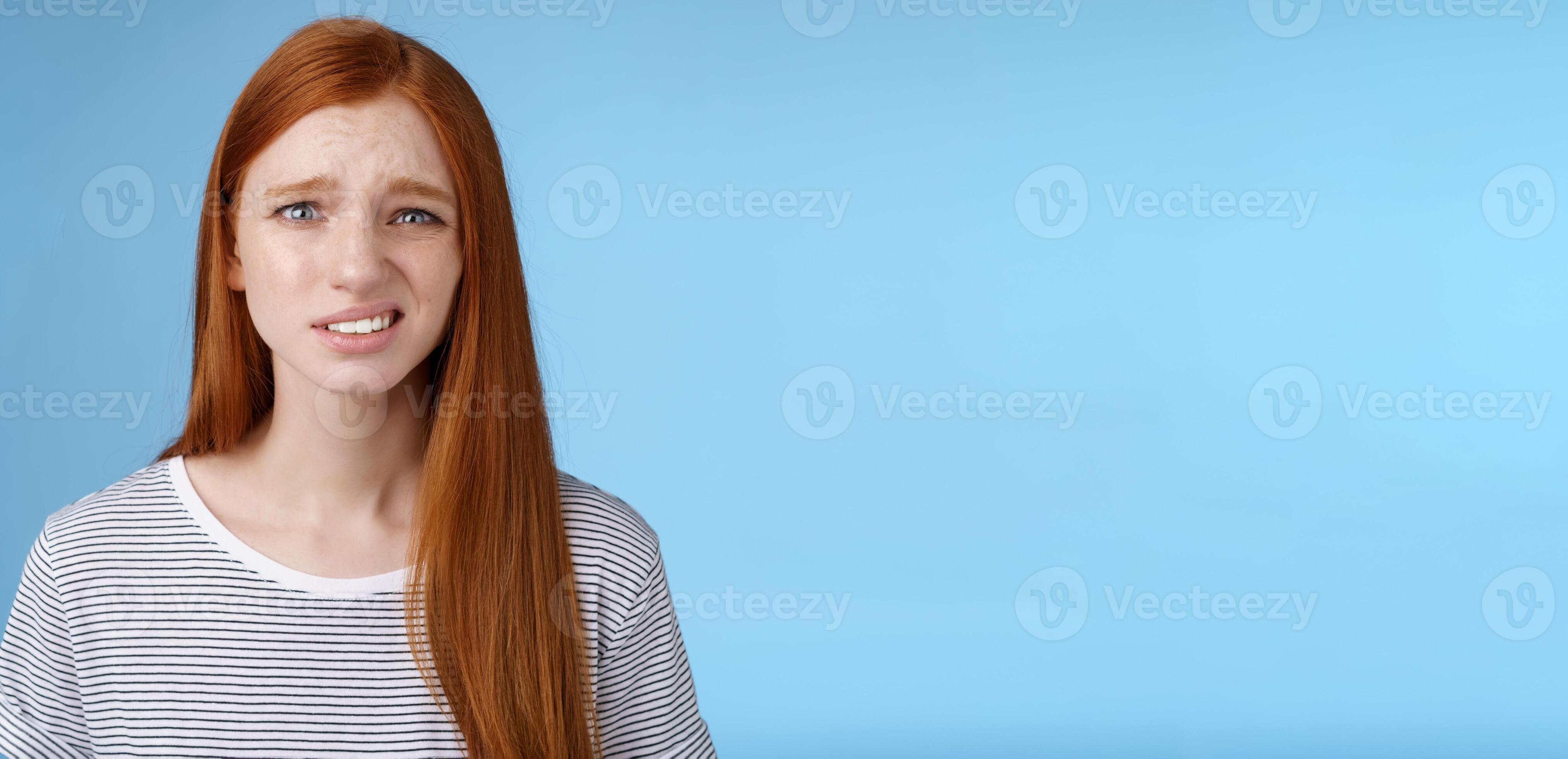 Displeased young awkward redhead girl cringe full disbelief smirking ...