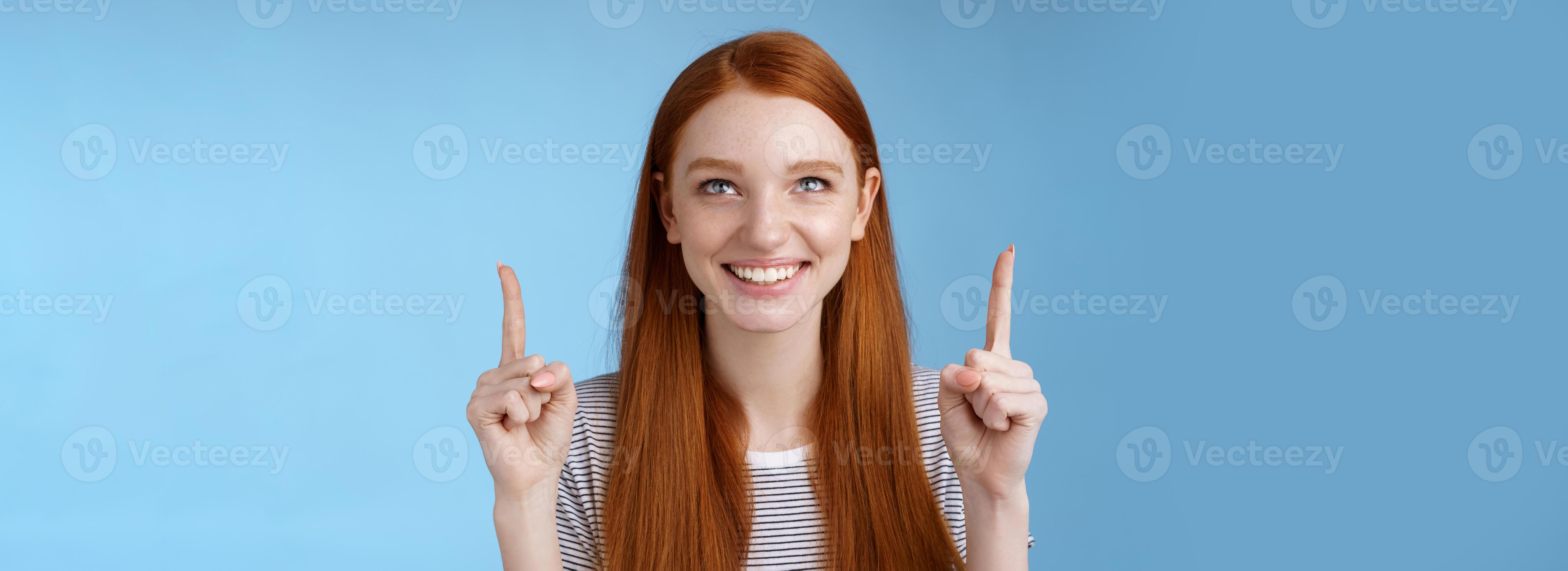 Amused Excited Happy Smiling Redhead Girl Look Pointing Up Grinning