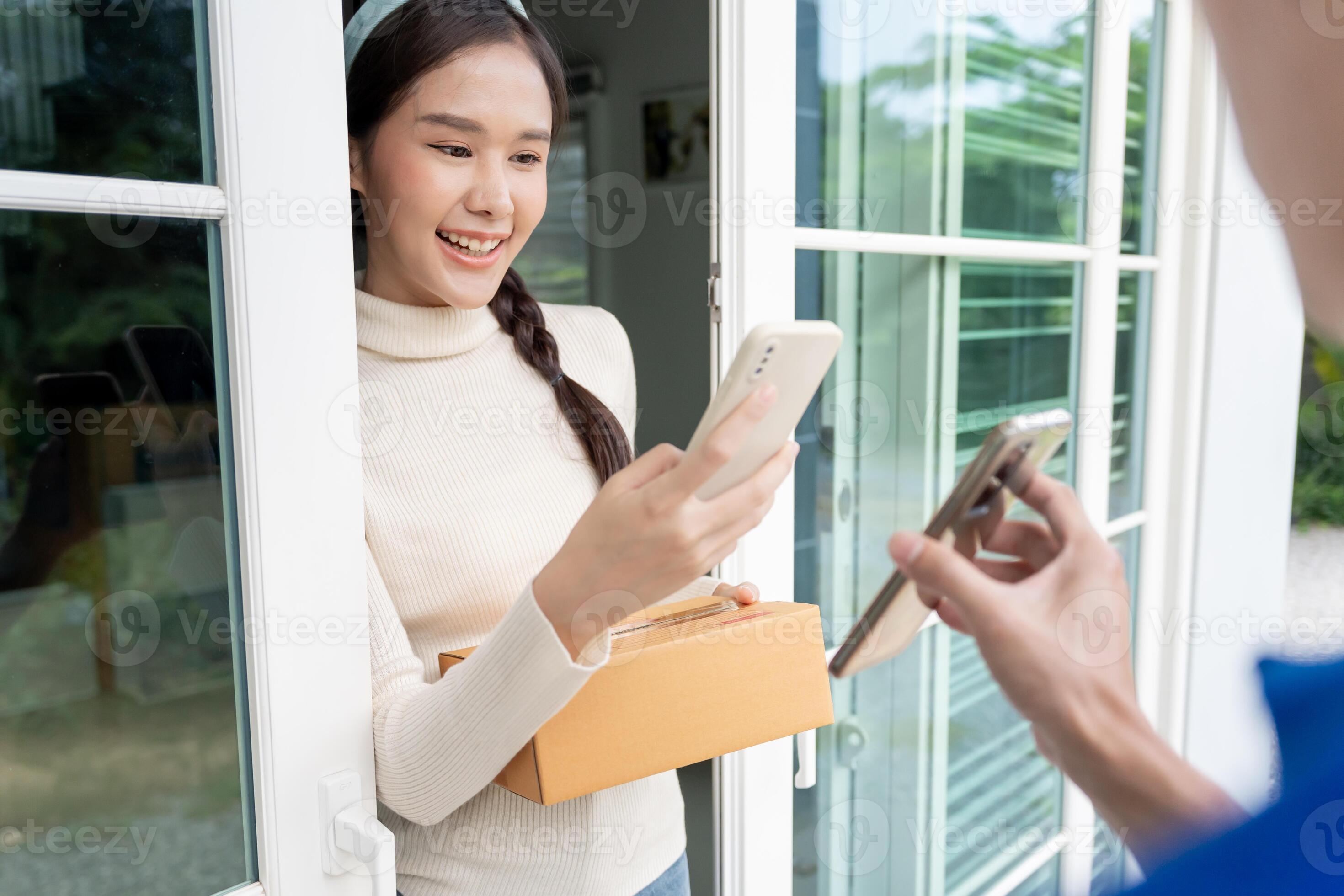 Happy smile Asian woman scan QR code for pay of food. Delivery man send deliver express. online ...