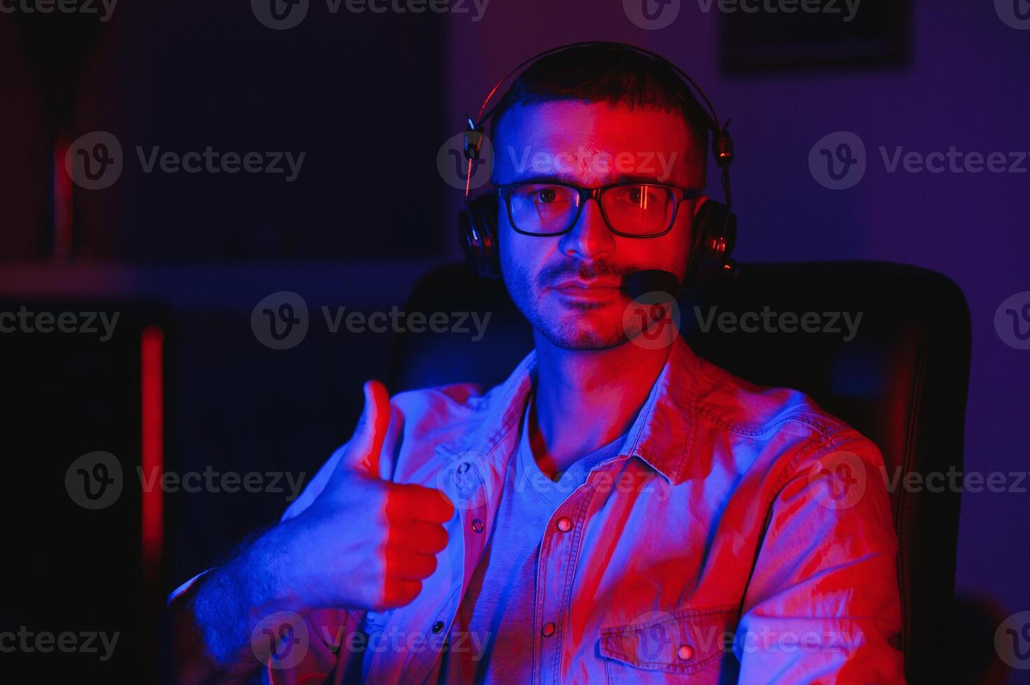 Handsome young male software developer programming codes while working ...