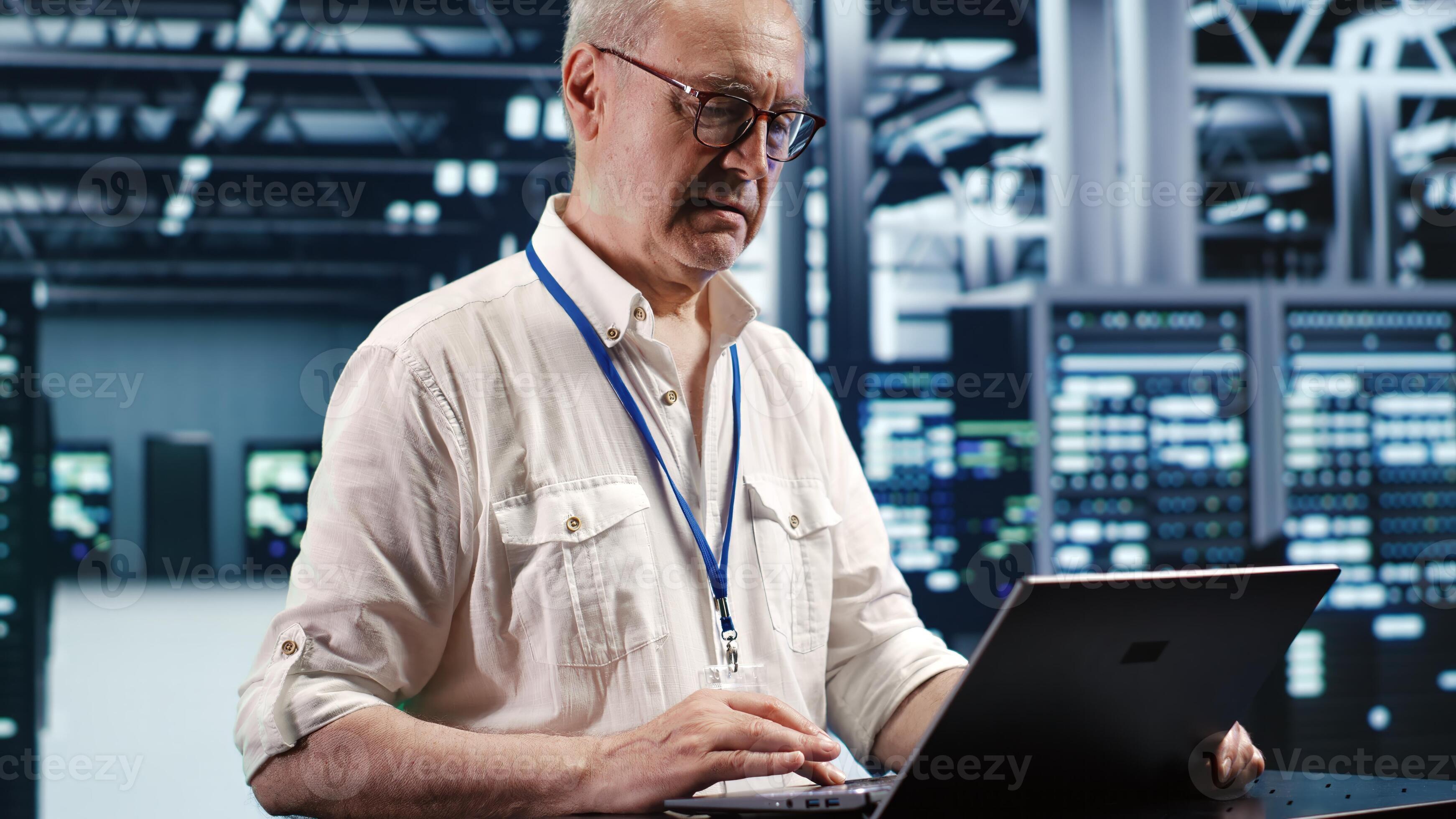 Trained engineer expertly managing data while navigating in industrial ... Trained engineer expertly managing data while navigating in industrial ...