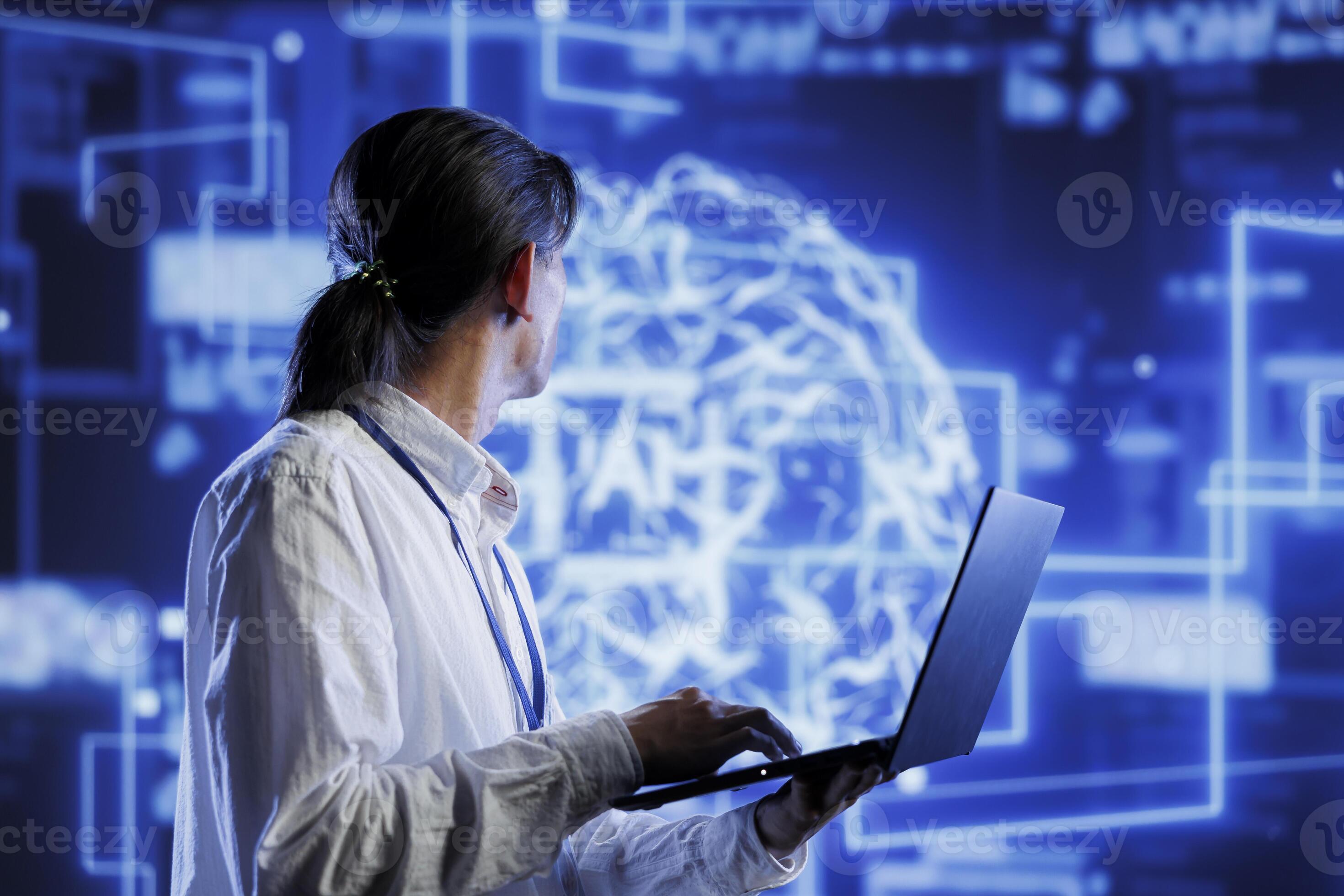 Licensed Developer Using Laptop To Maintenance Artificial Intelligence