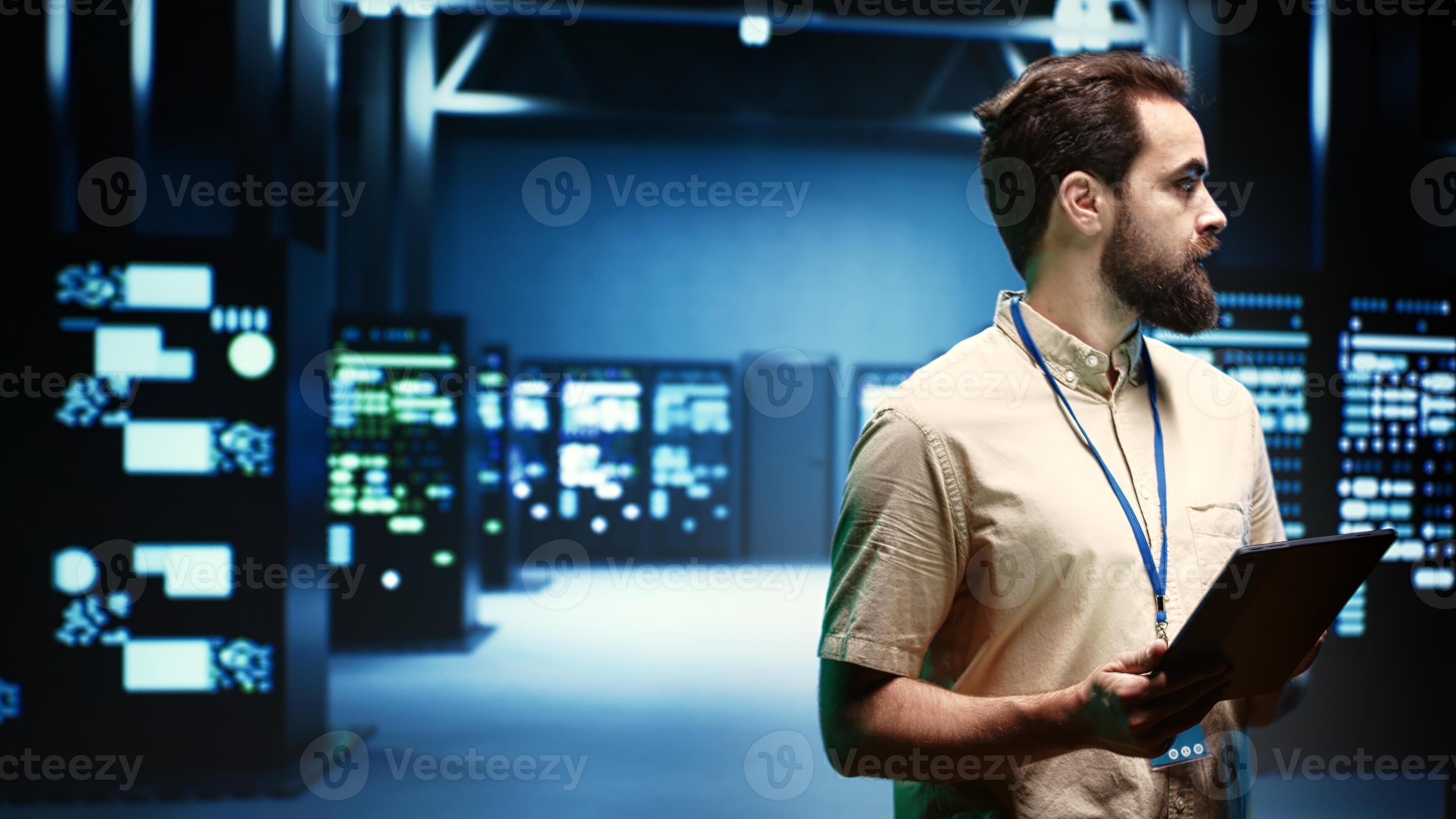 IT specialist in server room ensuring valuable data remains secure from ...