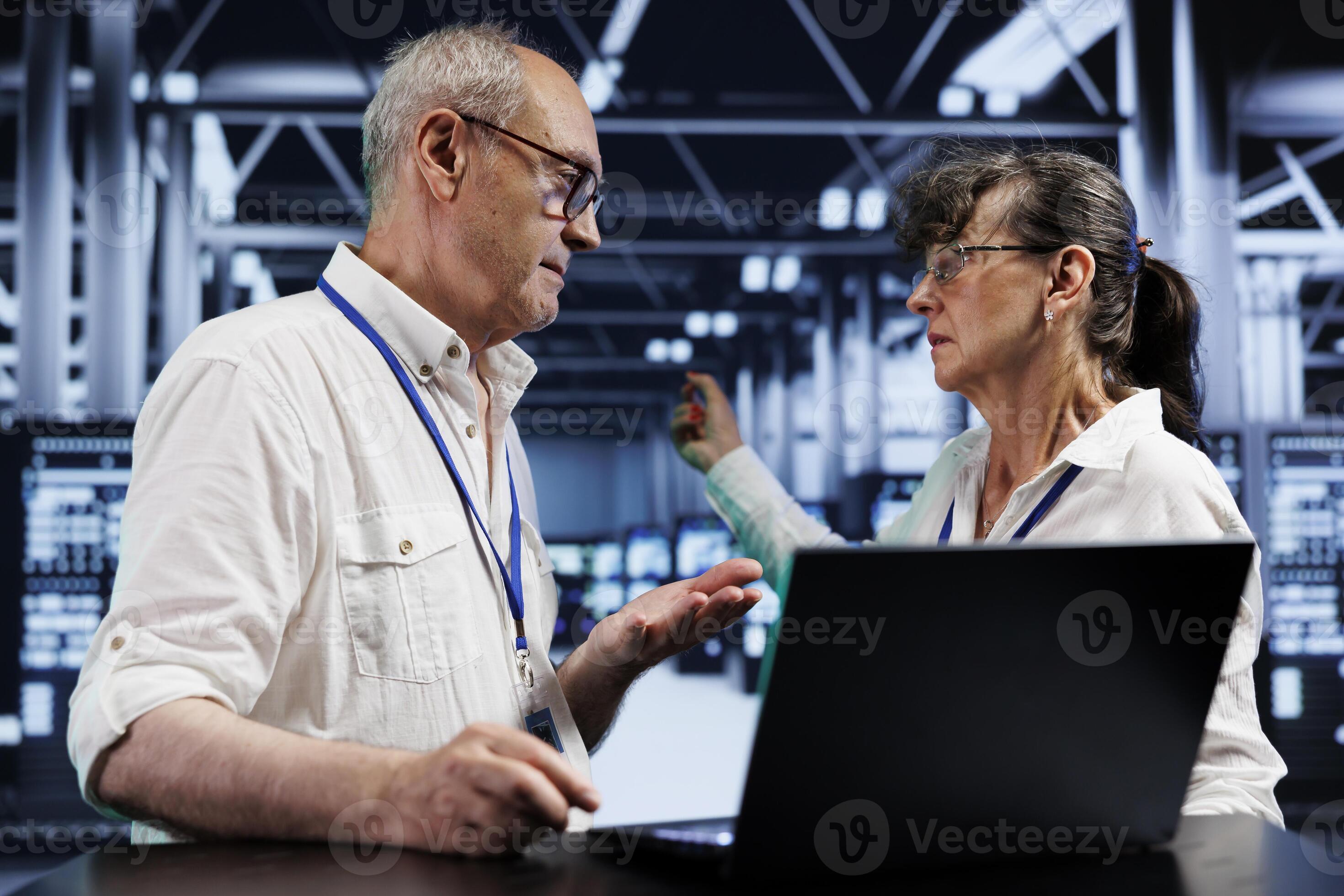 Senescent experts discussing how to best prevent strain on server hub systems caused by AI ...