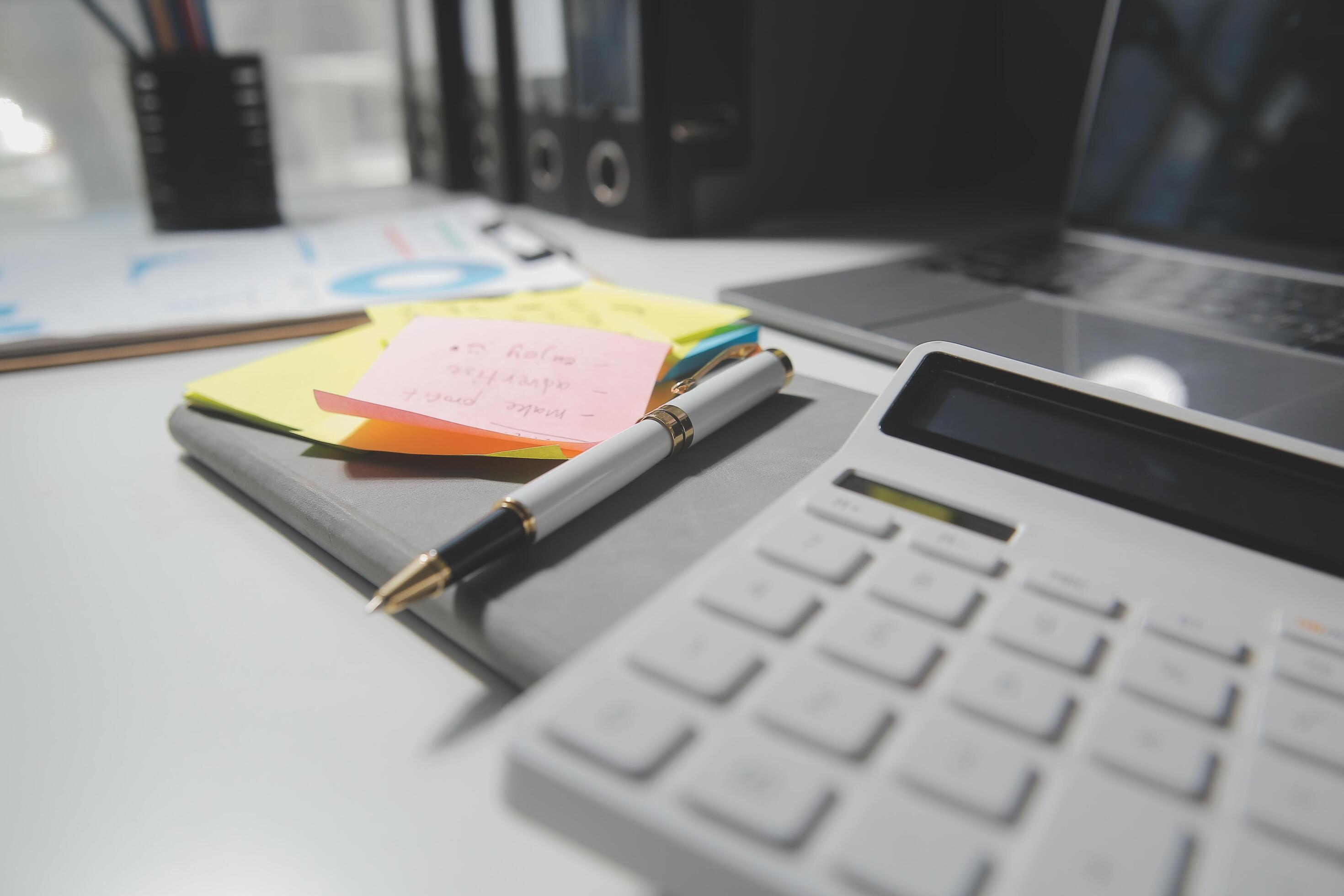Studio workspace with laptop computer and office supplies. Work from ...