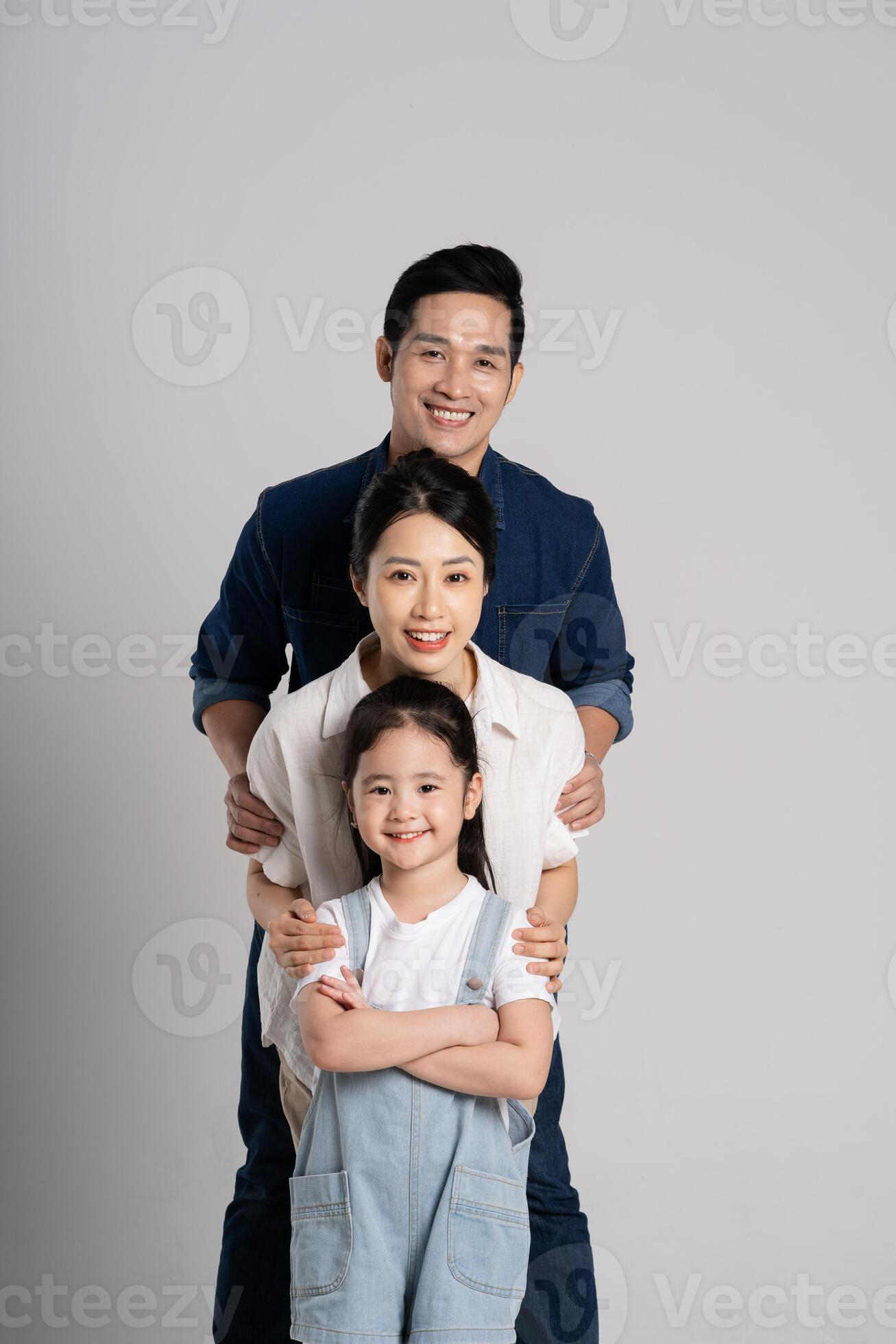 Asian family portrait posing on white background 41060257 Stock Photo at Vecteezy