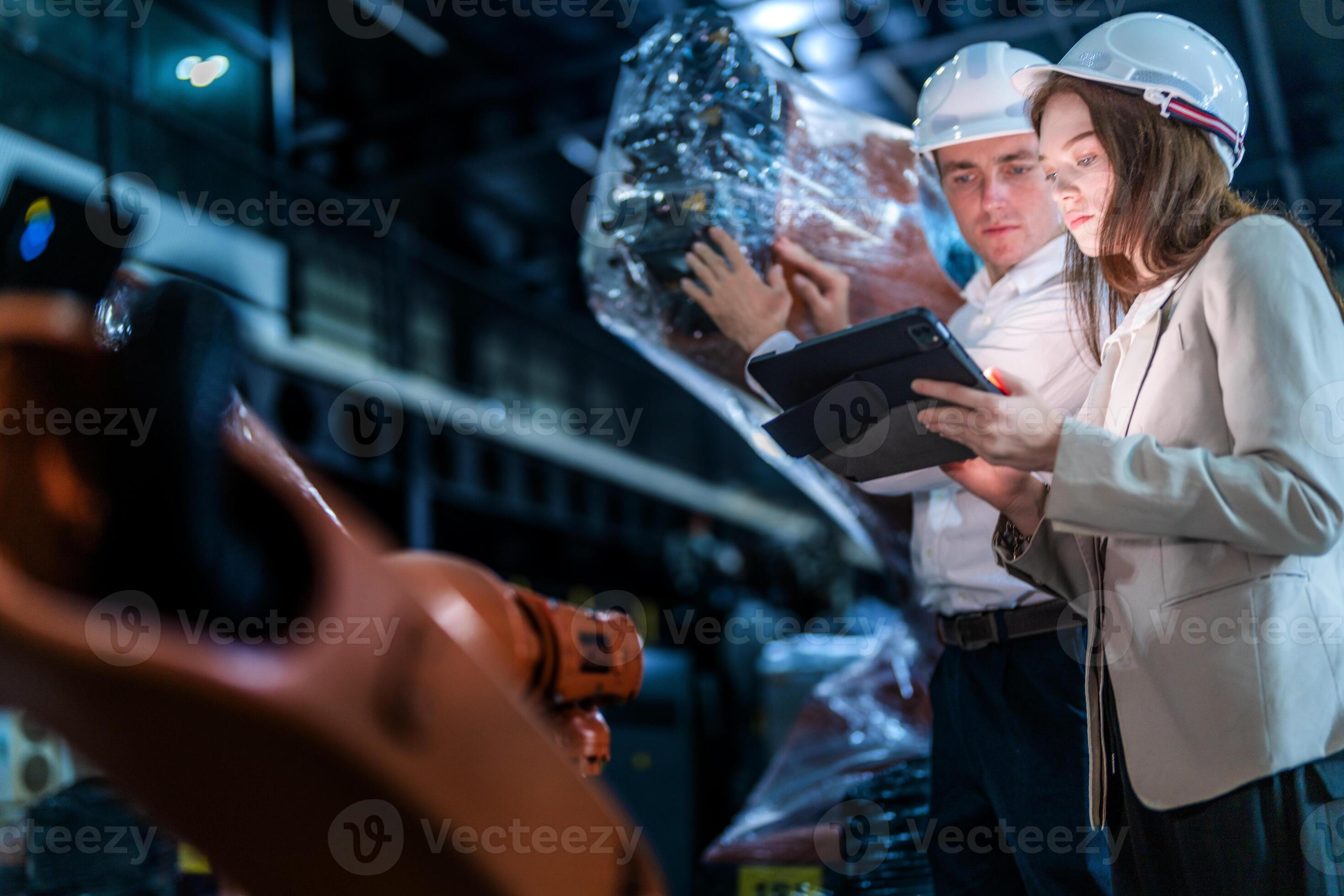 Sales manager and factory owner in suits negotiating selling robots used in the factory ...