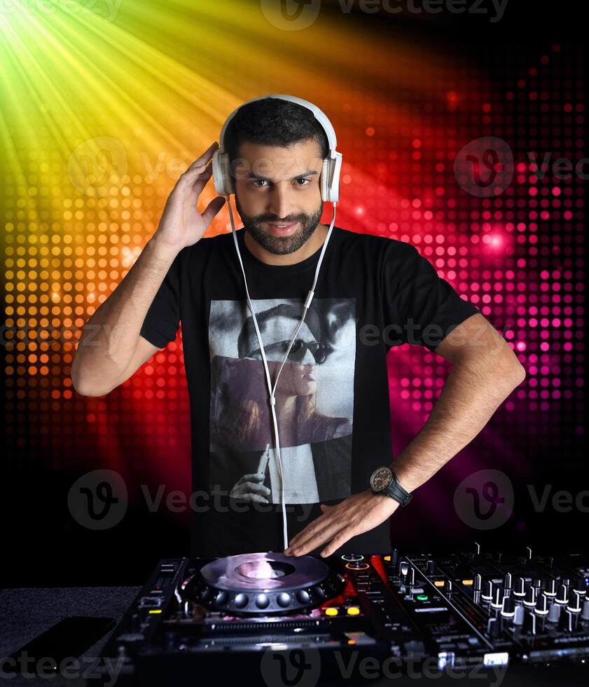 young DJ posing with his headphones 41512061 Stock Photo at Vecteezy