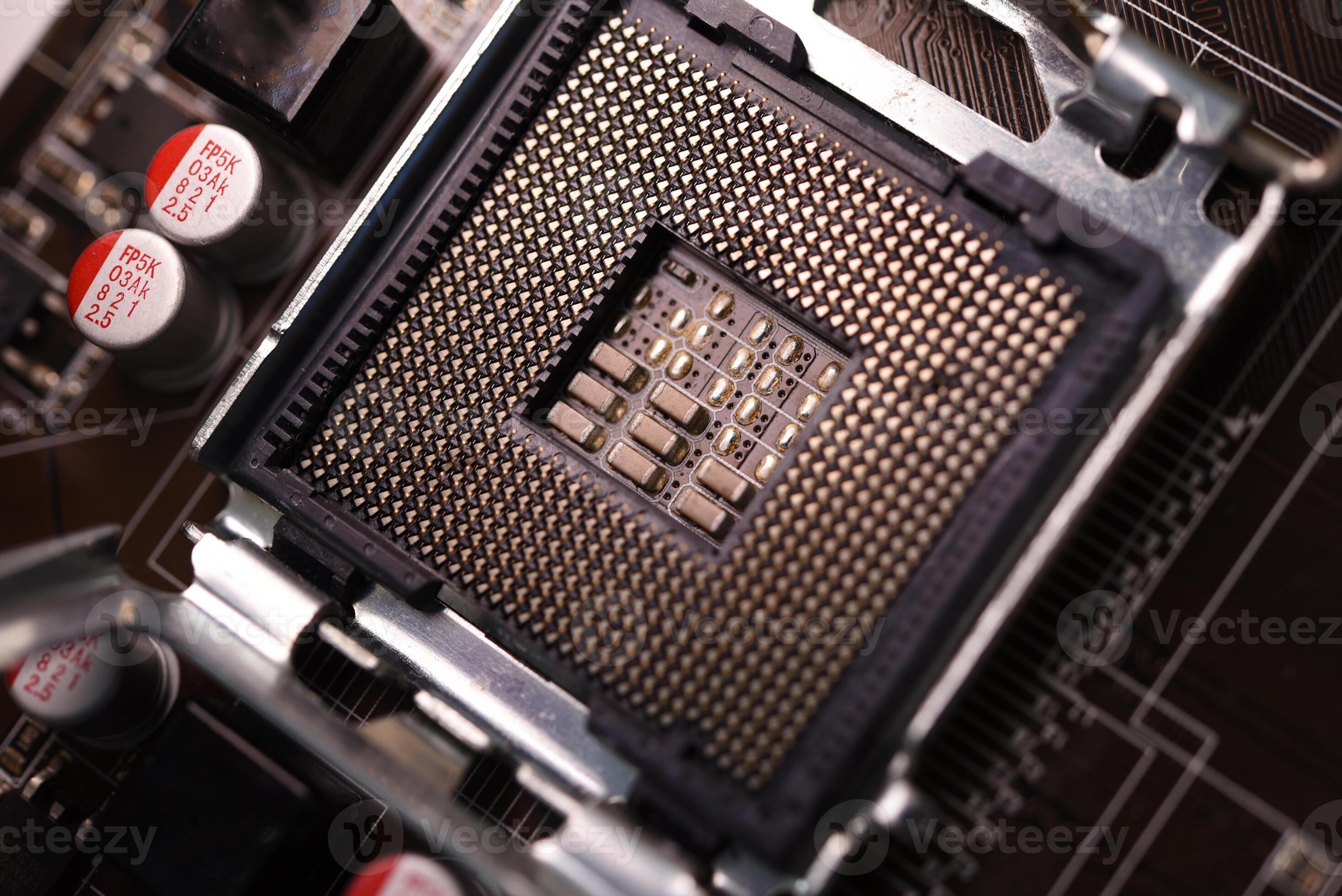 Microprocessor and socket on the motherboard. Computer radio components ...