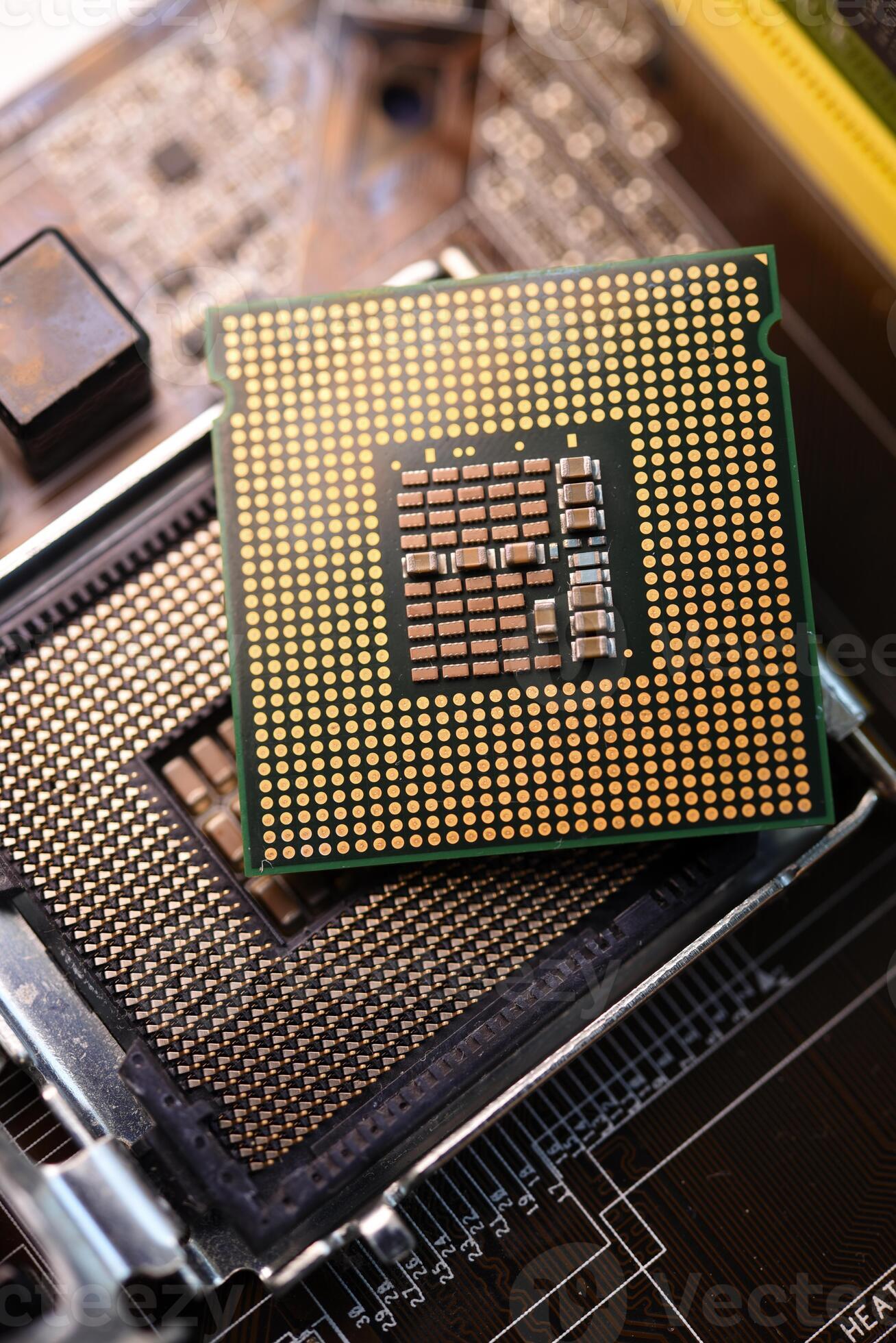 Microprocessor and socket on the motherboard. Computer radio components ...