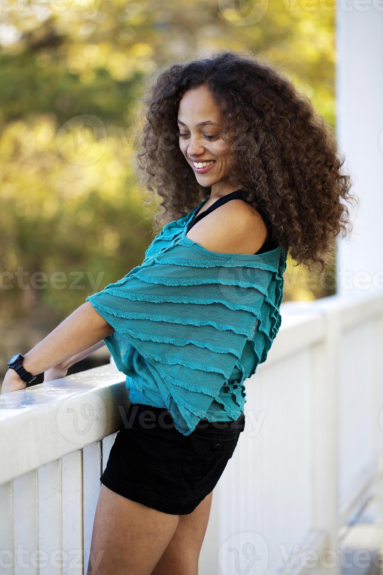 Young Mixed Black Woman Blue Top Outdoors 42551972 Stock Photo at Vecteezy Young Mixed Black Woman Blue Top Outdoors 42551972 Stock Photo at Vecteezy