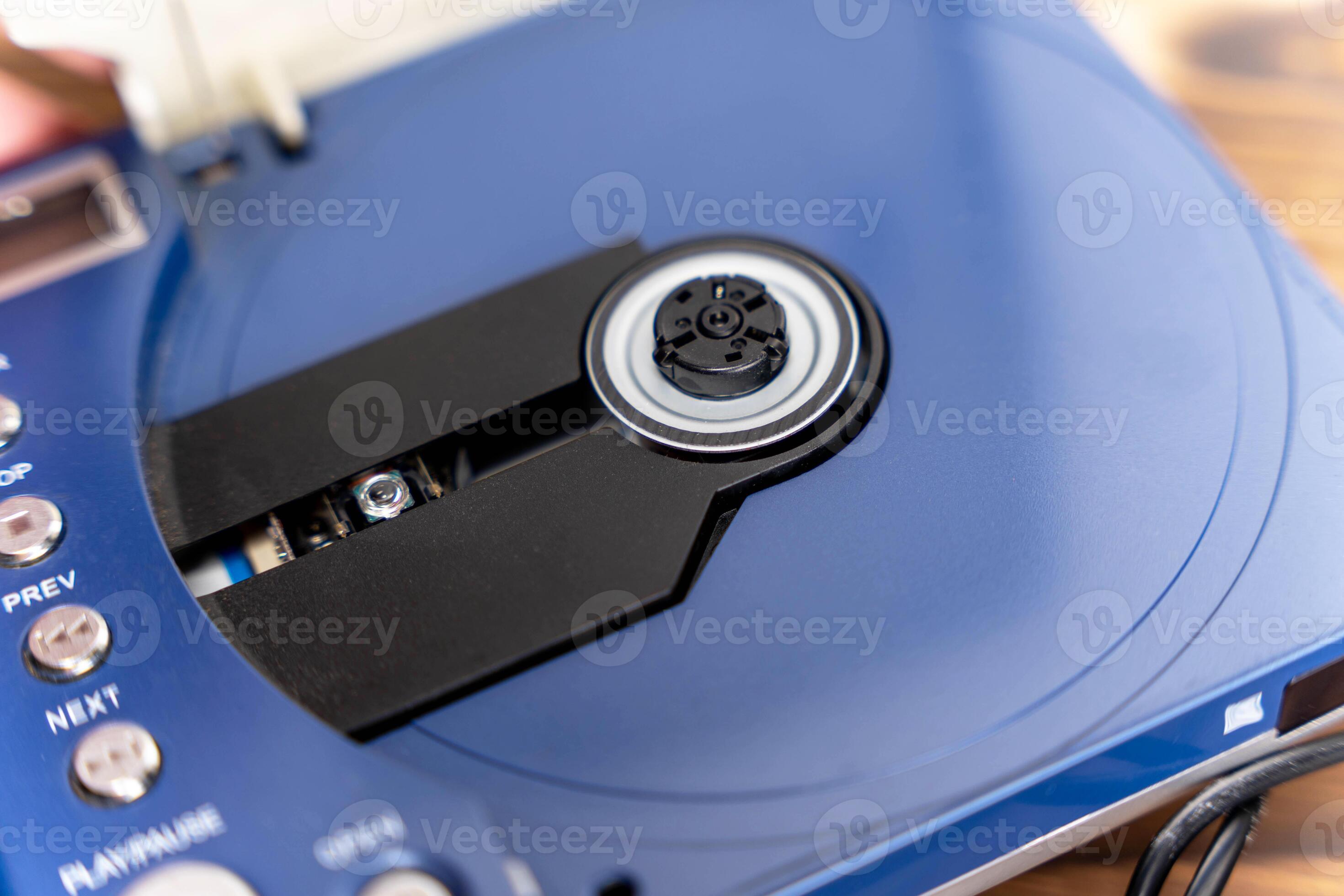 Close Up of a CD Player With Remote Control. DVD player. control ...