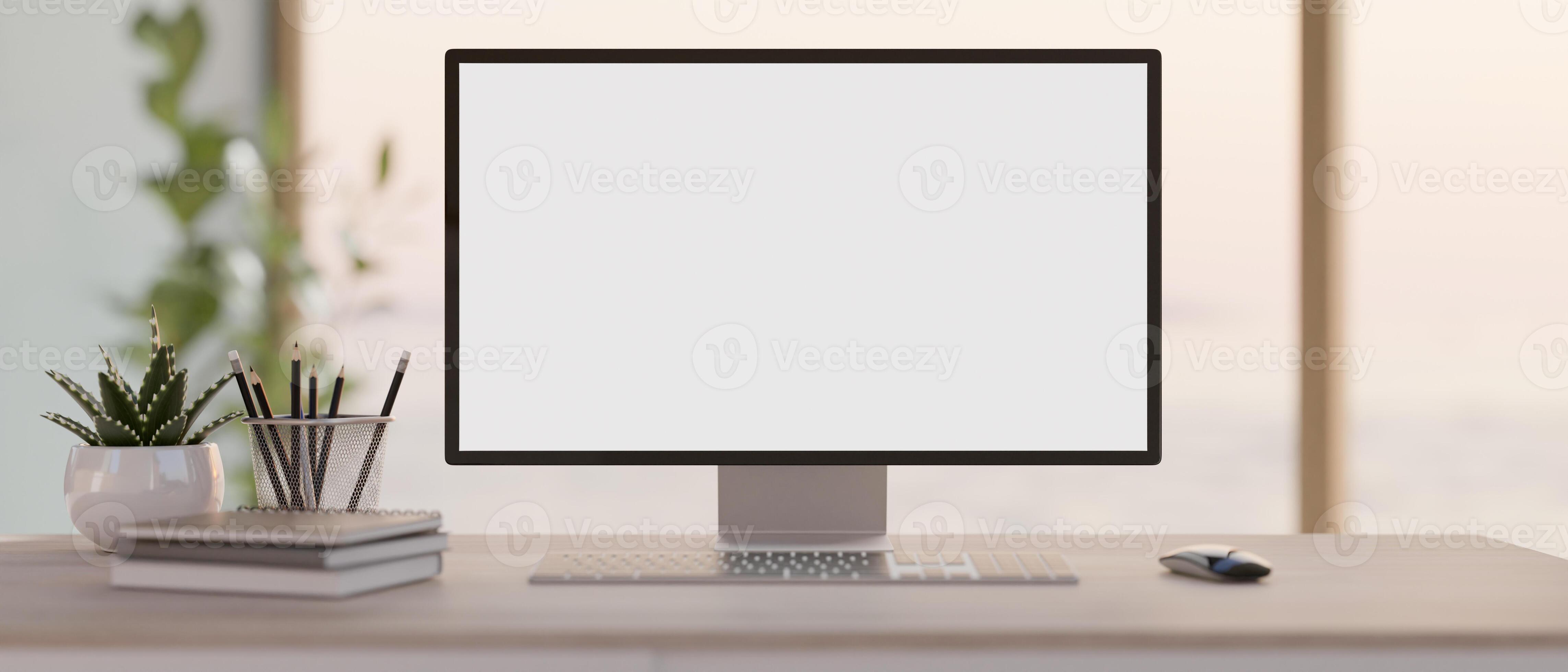 A front view image of a PC computer white-screen mockup on a desk in a ...