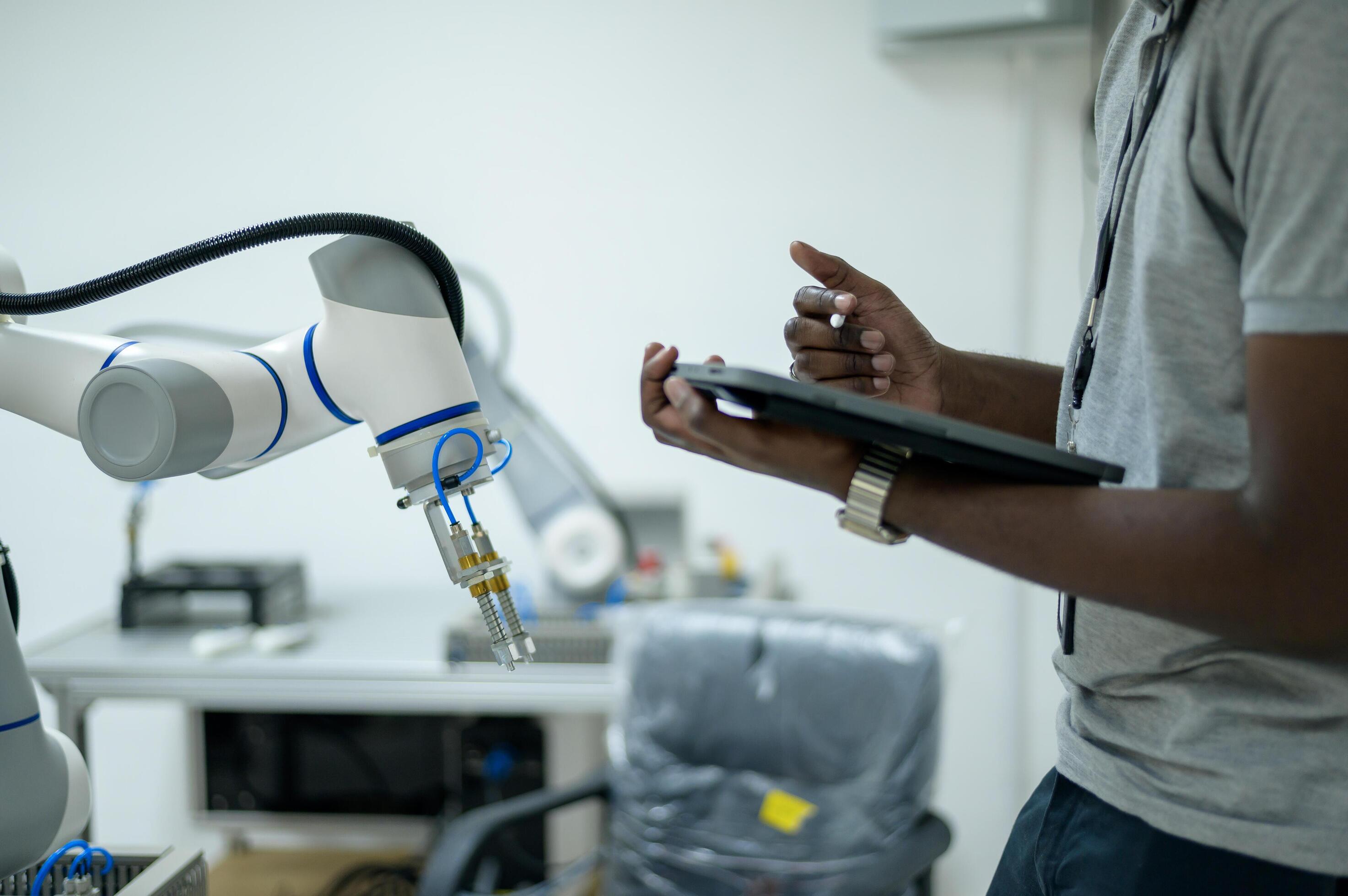 Trainee Robotics engineer learning with Programming and Manipulating ...