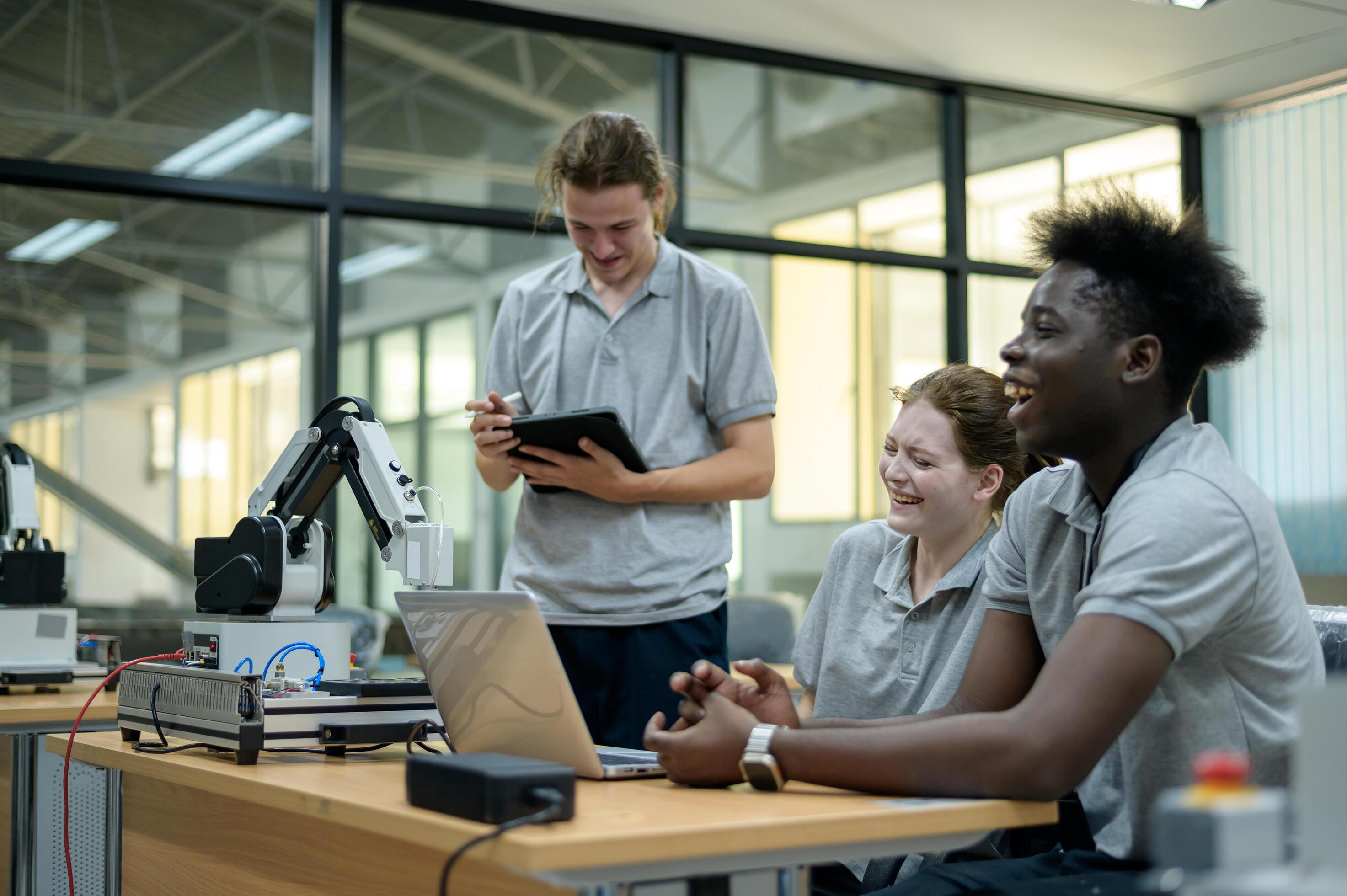 Trainee Robotics Engineer Learning With Programming And Manipulating Robot Hand Industrial