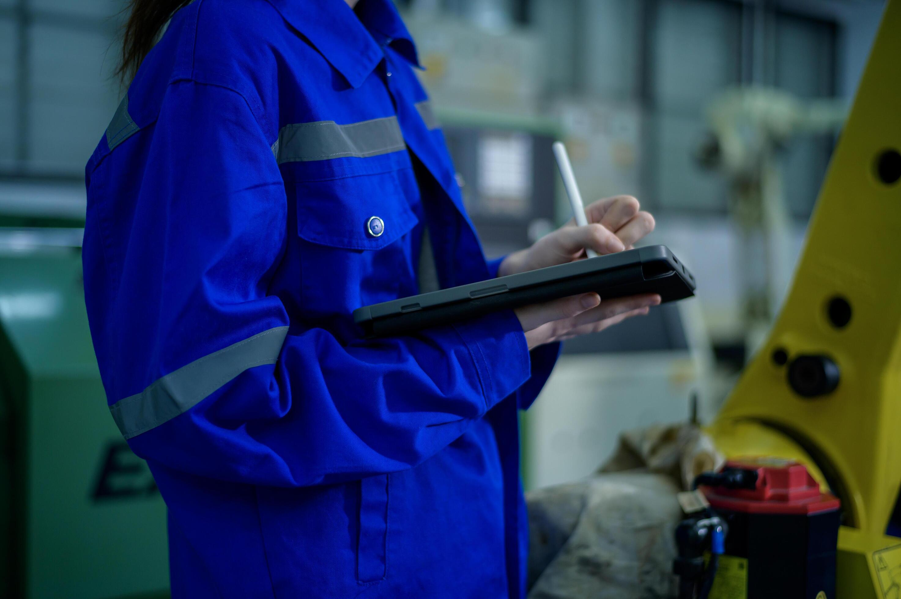 Female Robotics engineer working with Programming and Manipulating ...