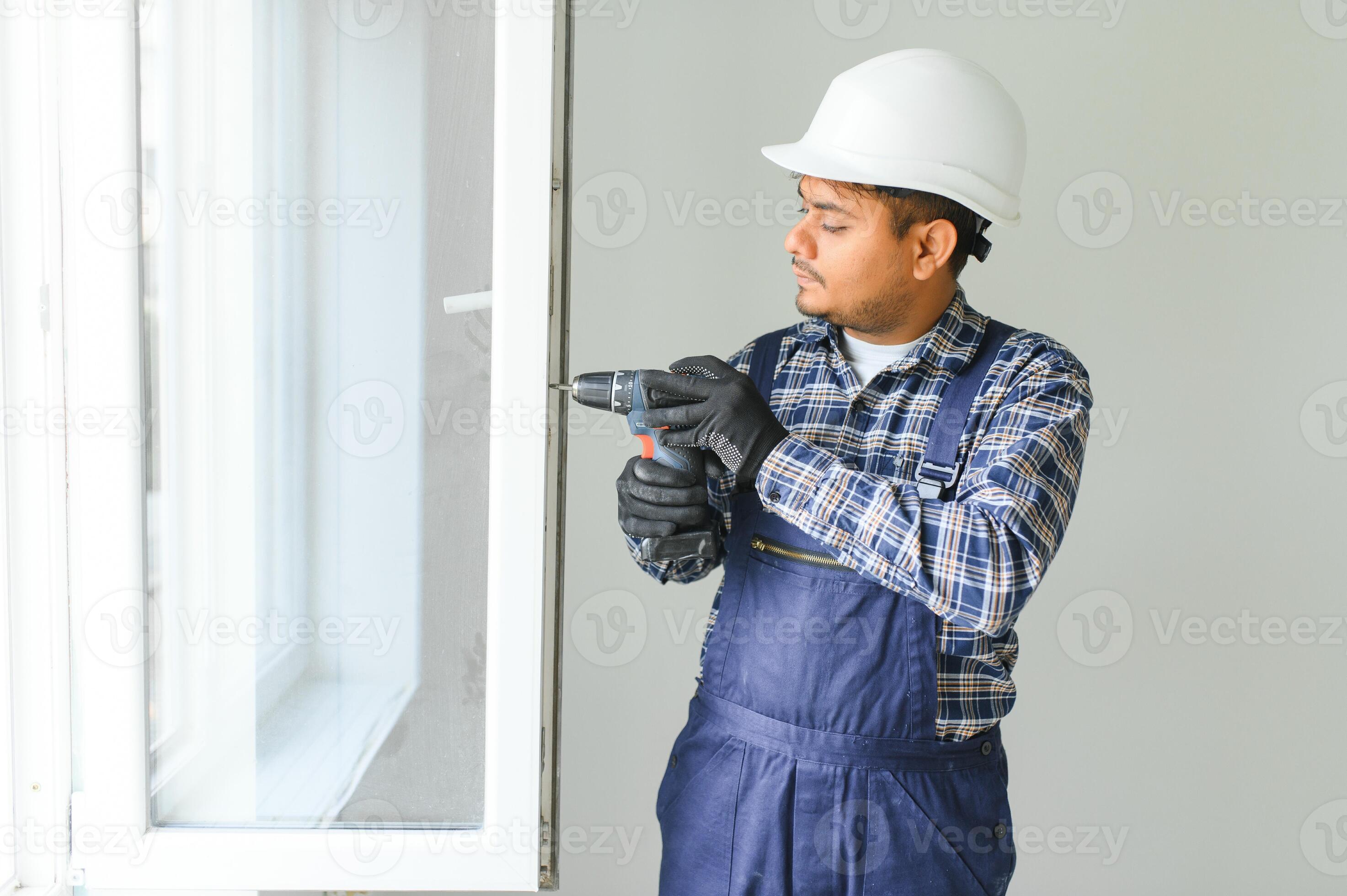 Indian service man installing window with screwdriver 43282172 Stock ... Indian service man installing window with screwdriver 43282172 Stock ...