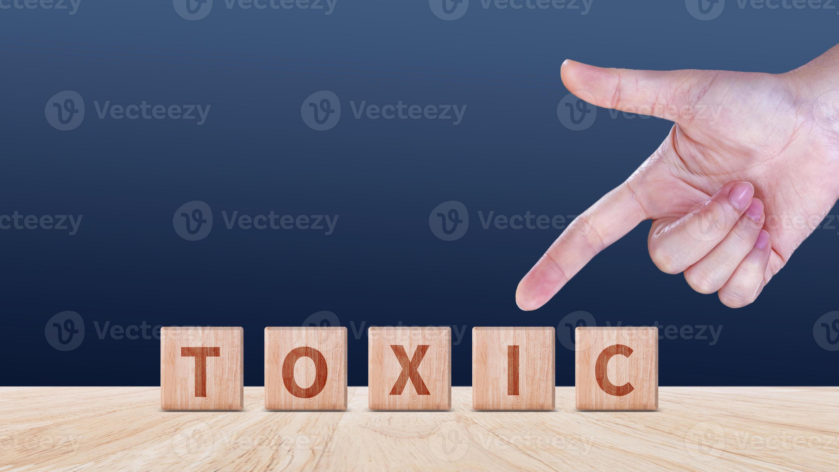 Toxic concept, Cubes wooden blocks form the word Toxic. extensive Toxic ...
