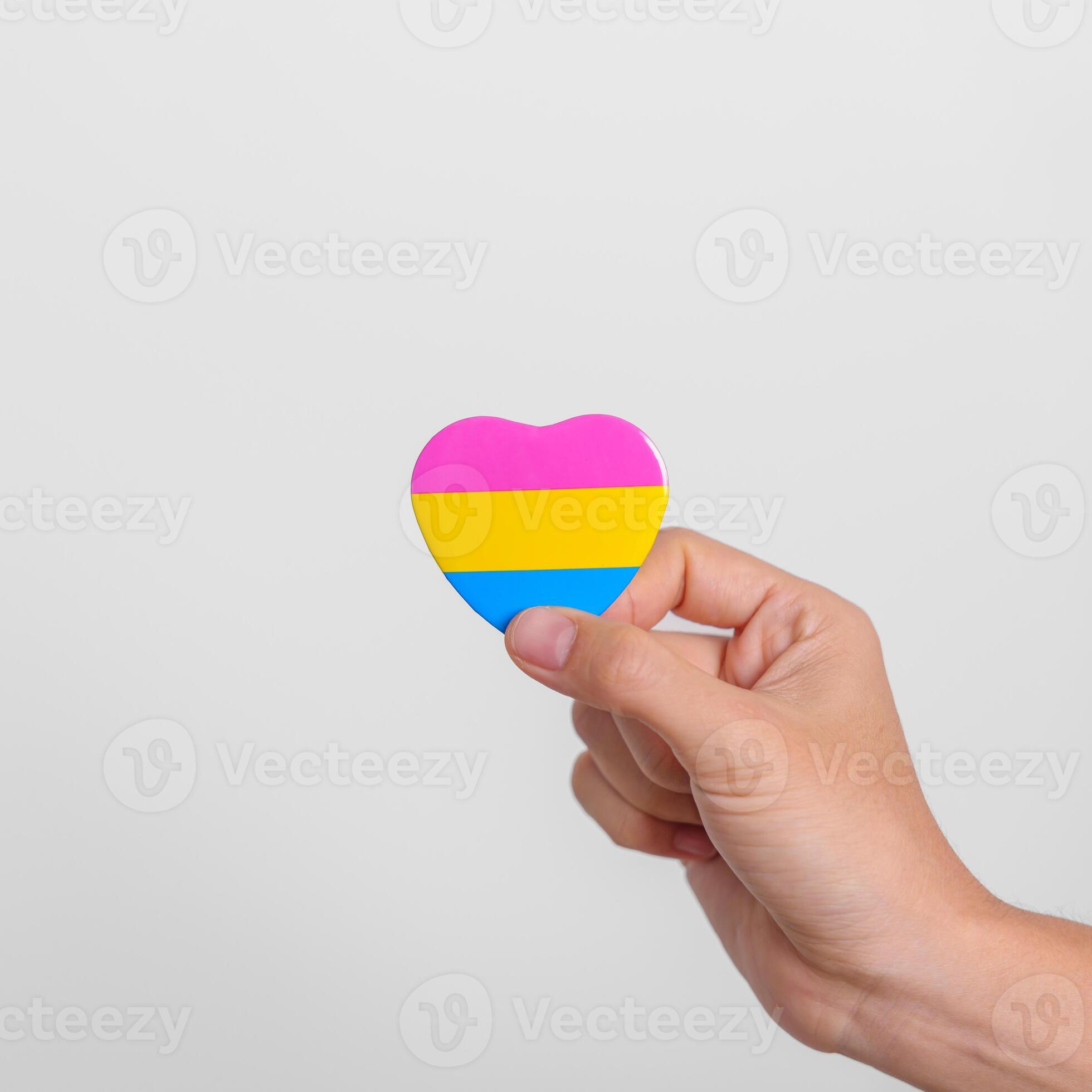 Pansexual Pride Day And Lgbt Pride Month Concept Hand Holding Pink