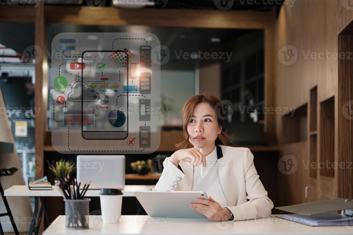 Female ux developer and ui designer sketching interface app in digital tablet in living room at ...