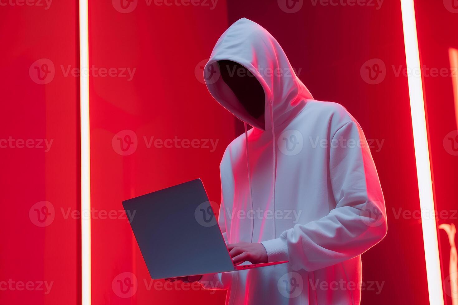 Fashionable Anonymous Hacker Typing Computer Laptop Cybercrime