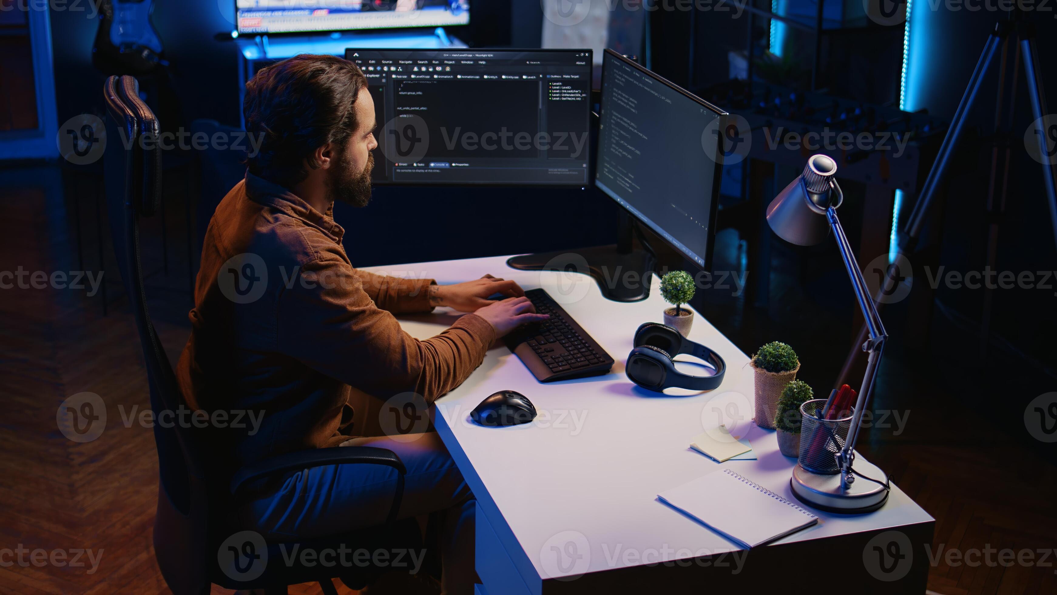 Computer Scientist Developing Code On Pc While In Apartment Office Using Java Programming
