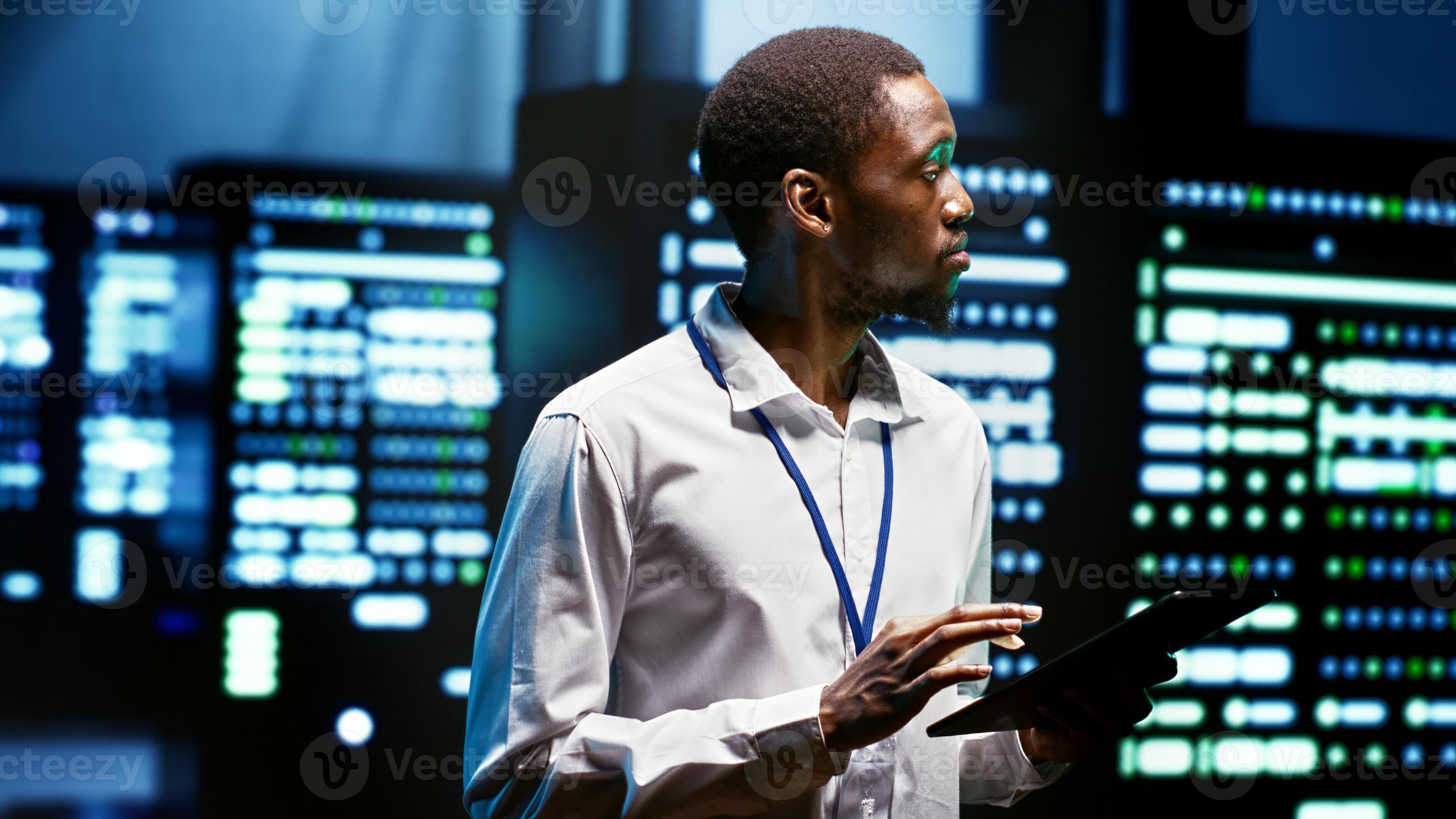 Specialist Using Tablet To Run Scans On Blade Servers In Data Storage And Cloud Computing