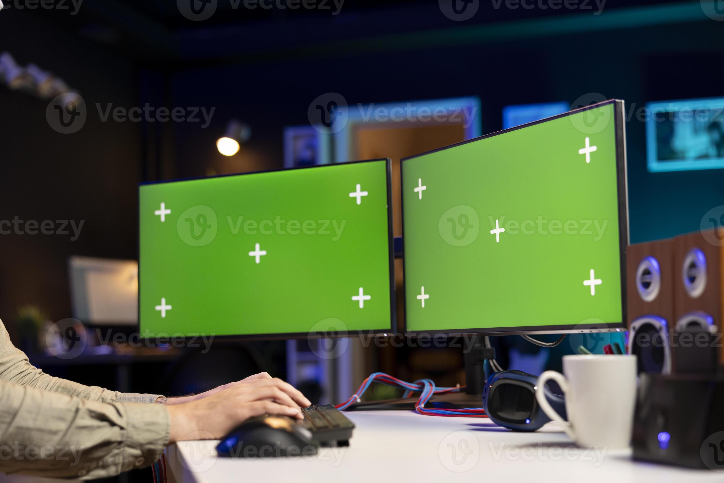 Programmer Designing And Developing Software Applications Using Green Screen Computer It