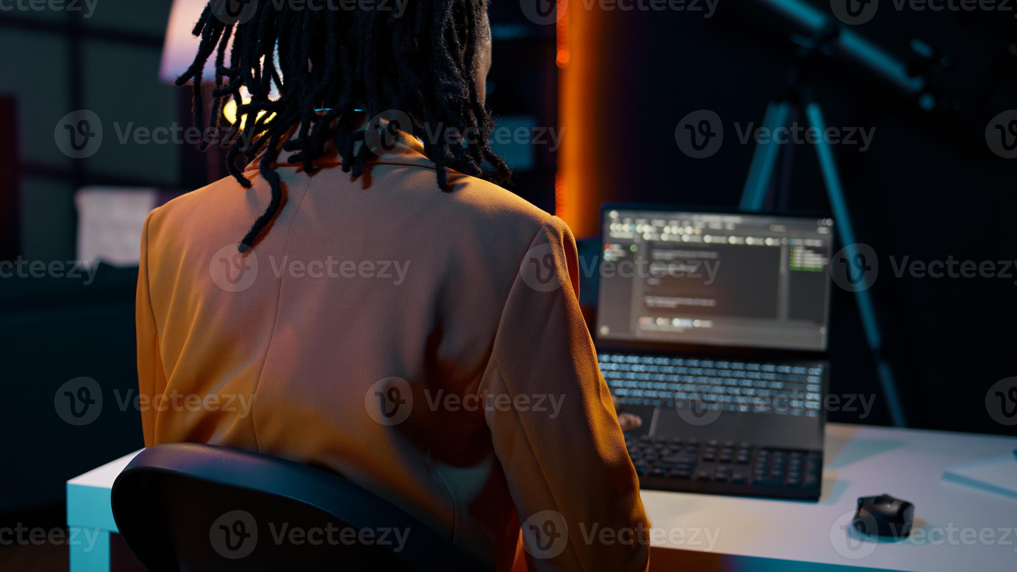 College student learning about outsourcing with html script, enjoying e learning and online ...