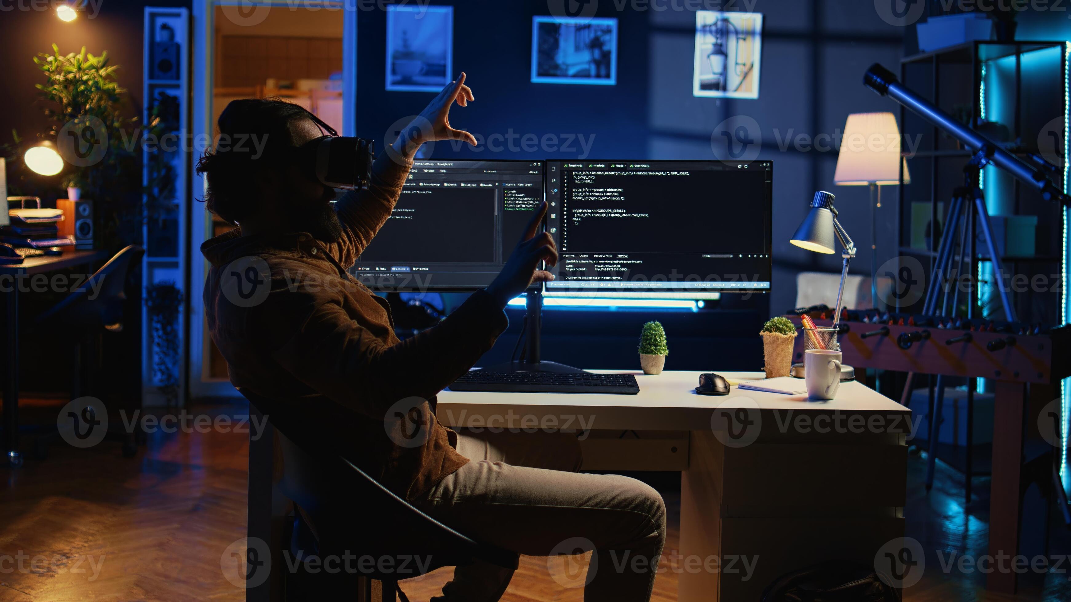 Self employed engineer using technologically advanced VR glasses in ...