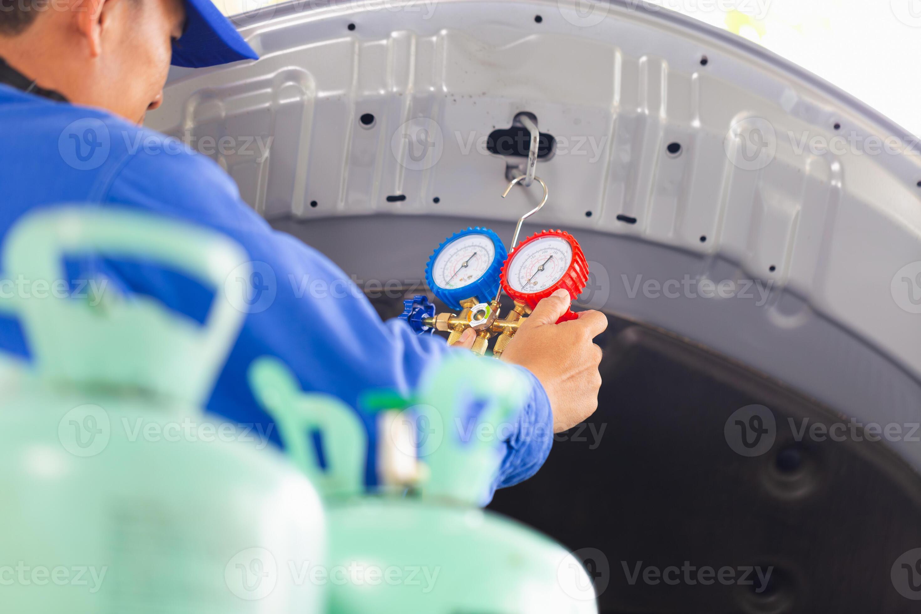 Technician man check car air conditioning system refrigerant recharge, Car Air Conditioning ...