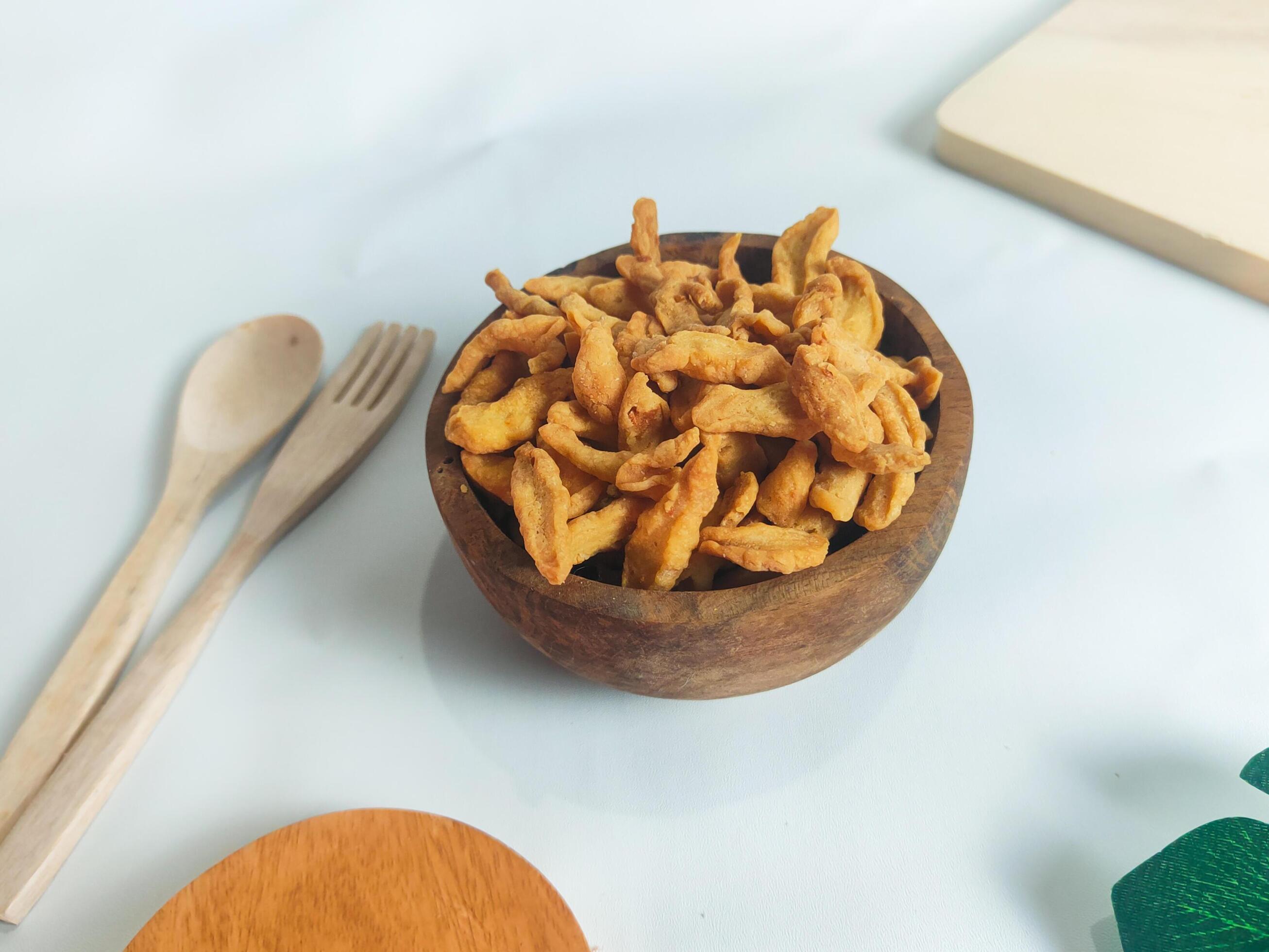 photography of cimi-cimi snack food in a wooden bowl on a white background 44565896 Stock Photo ...