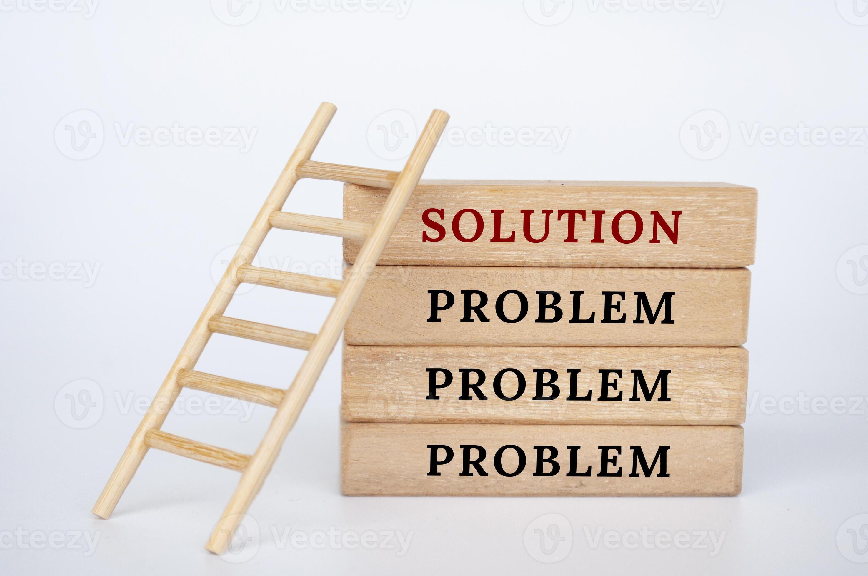 Wooden block with text, problem and solutions. Solutions to problems ...