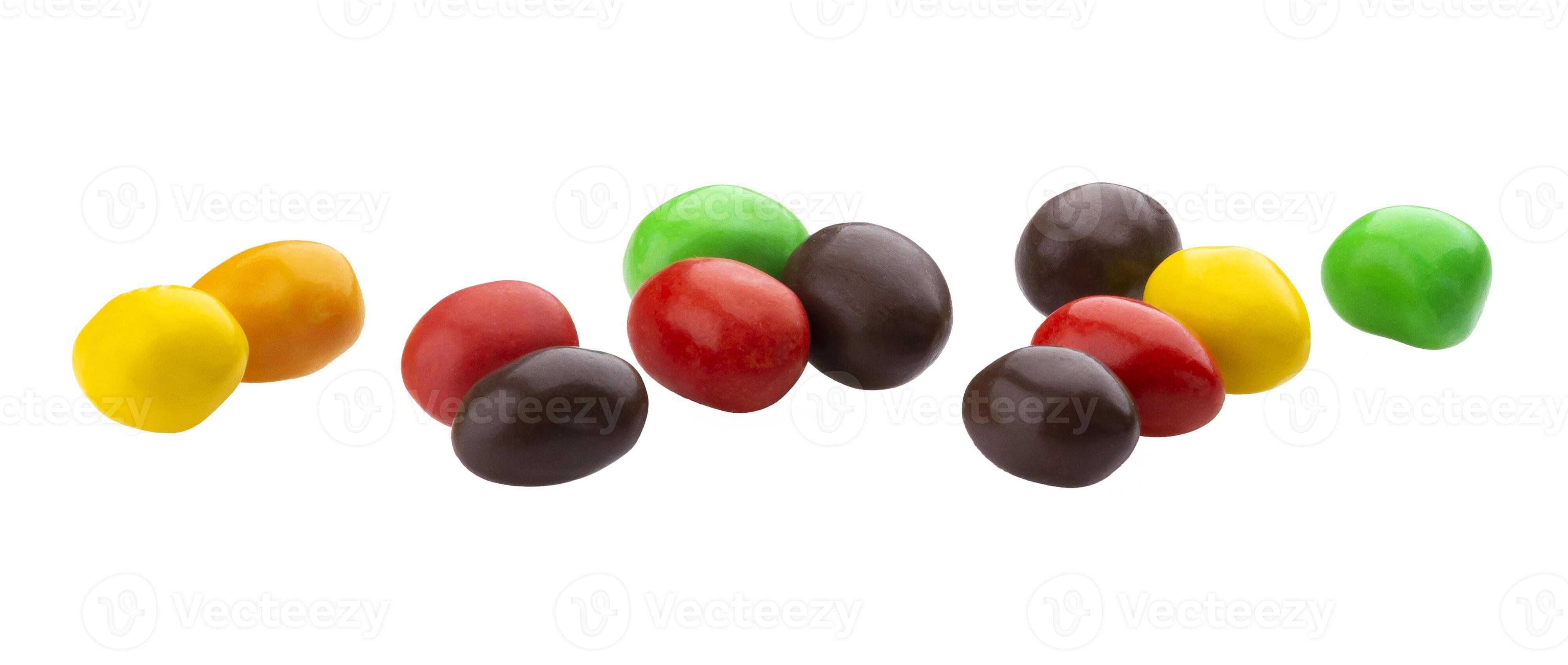 Multicolor shiny nuts and raisins dragee isolated on white background ... Multicolor shiny nuts and raisins dragee isolated on white background ...