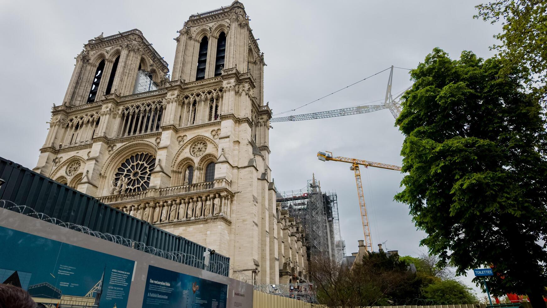 Restoration Of Notre Dame Cathedral With Construction Cranes In Paris