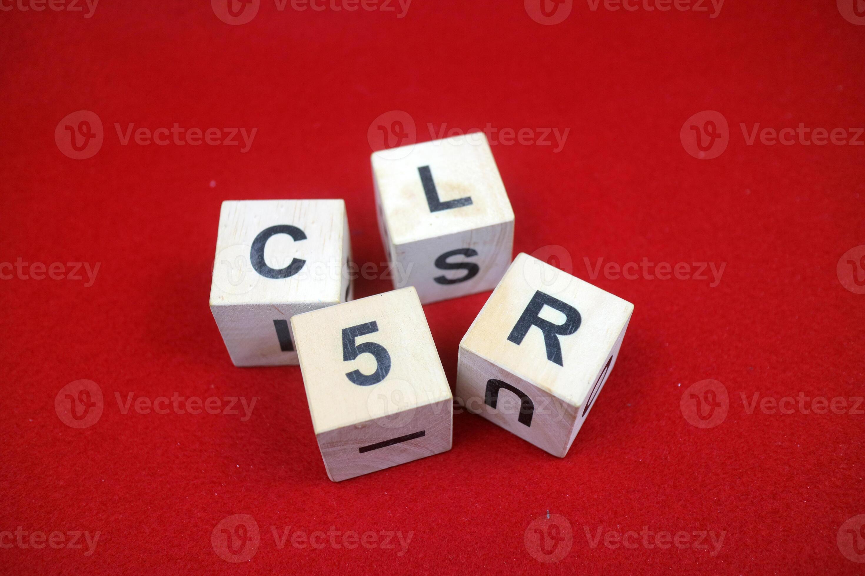 Educational stacking cube toy made of wood with numbers and letters ...