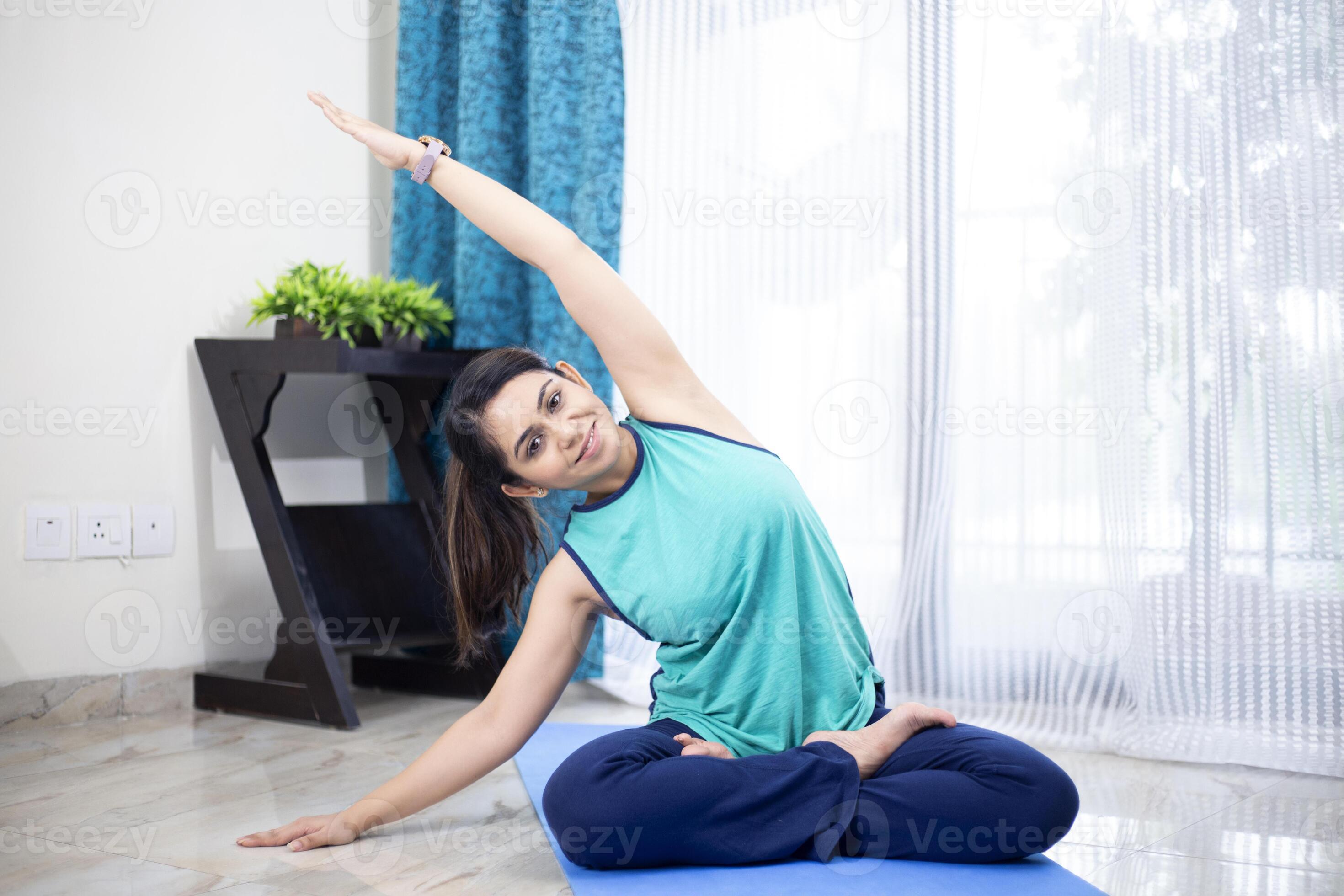 Athletic Babe Doing Seated Side Bend Pose Parsva Sukhasana Exercise ... Athletic Babe Doing Seated Side Bend Pose Parsva Sukhasana Exercise ...
