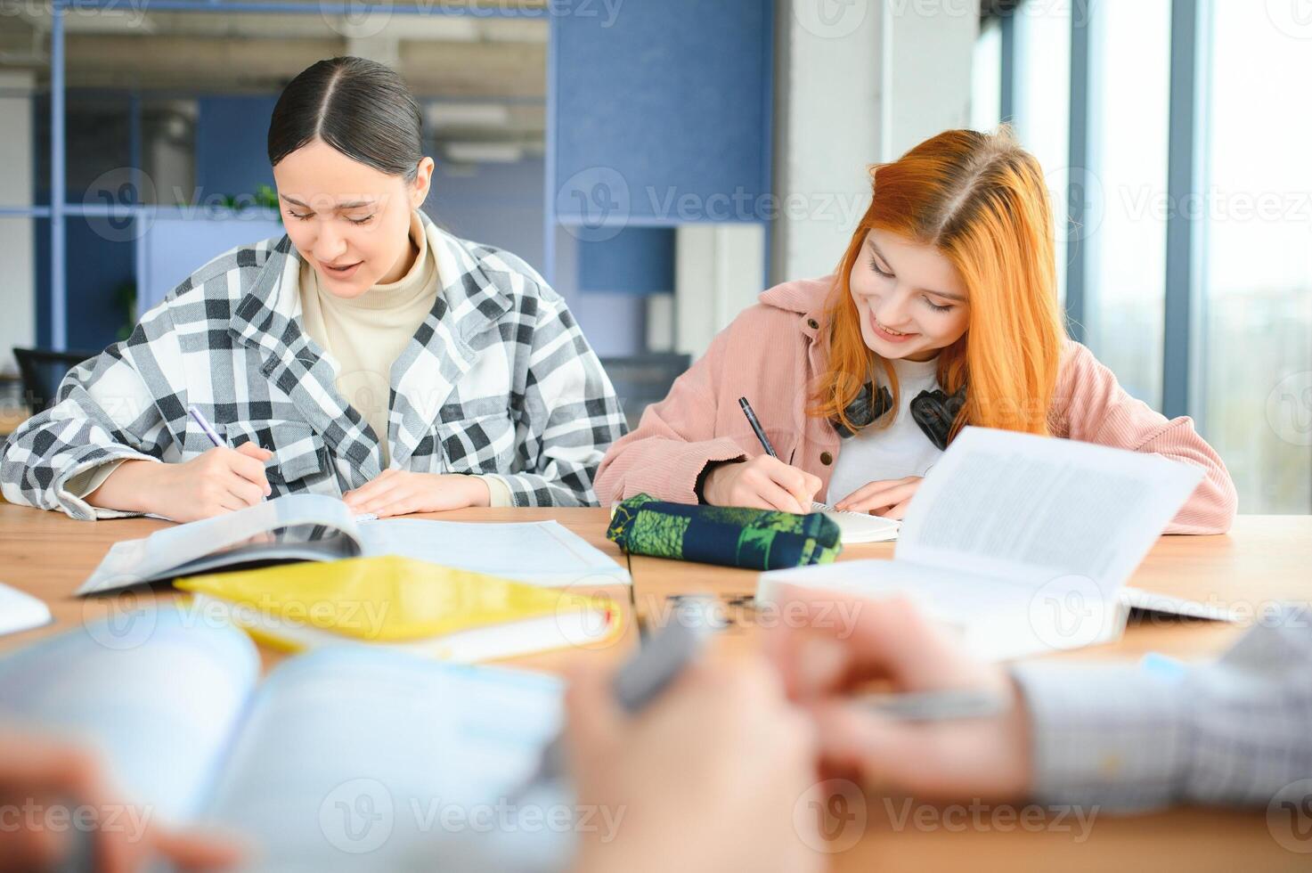 Group of college students doing homework 45672824 Stock Photo at Vecteezy Group of college students doing homework 45672824 Stock Photo at Vecteezy