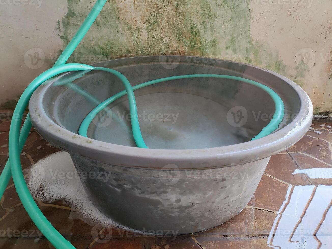 overflowing bucket full of water 45843692 Stock Photo at Vecteezy