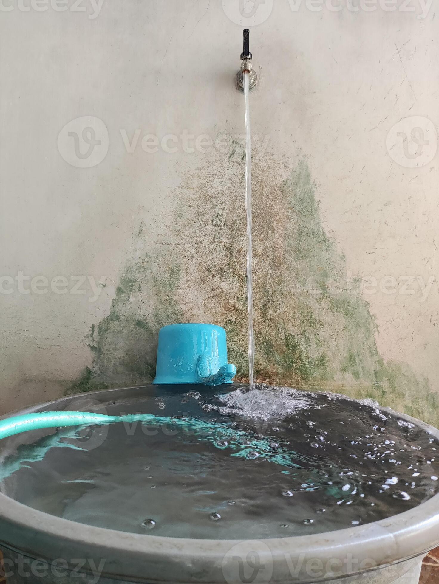 overflowing bucket full of water 45843702 Stock Photo at Vecteezy