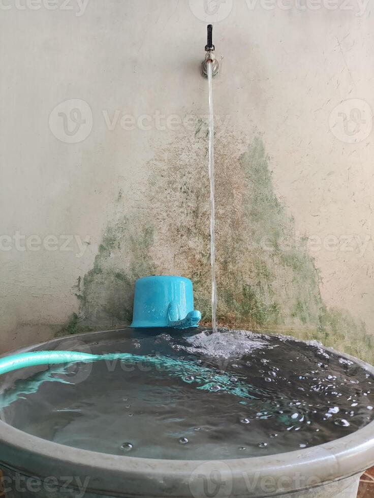 overflowing bucket full of water 45843702 Stock Photo at Vecteezy